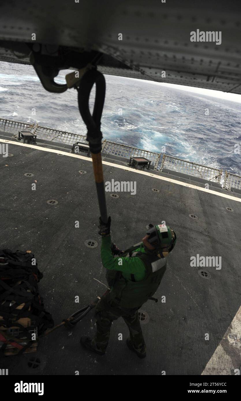 US Navy A Sailor aboard the Military Sealift Command fast combat ...