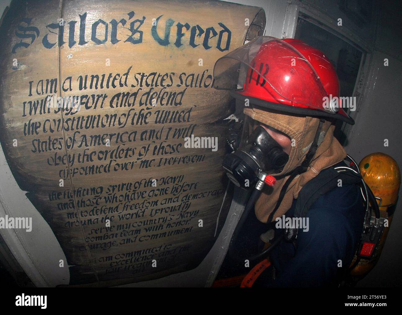 US Navy A Sailor assigned to the at-sea fire party aboard the Nimitz ...