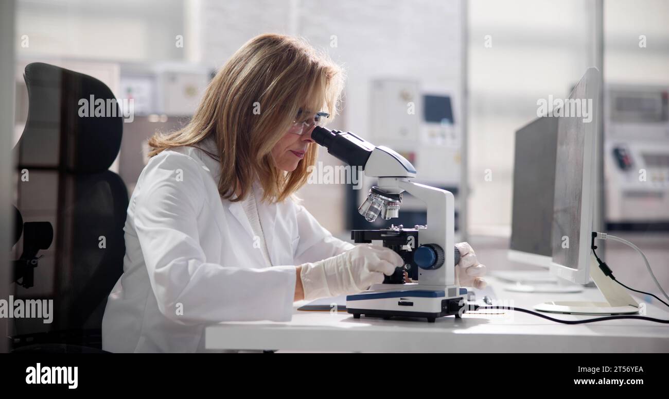 Female Computer Scientist Conducts Research in Hospital Lab Stock Photo ...