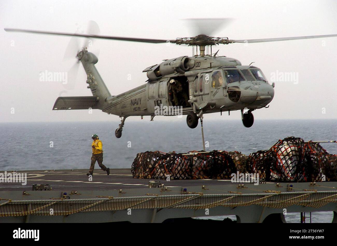 US Navy A sailor on the flight deck of the Military Sealift Command ...