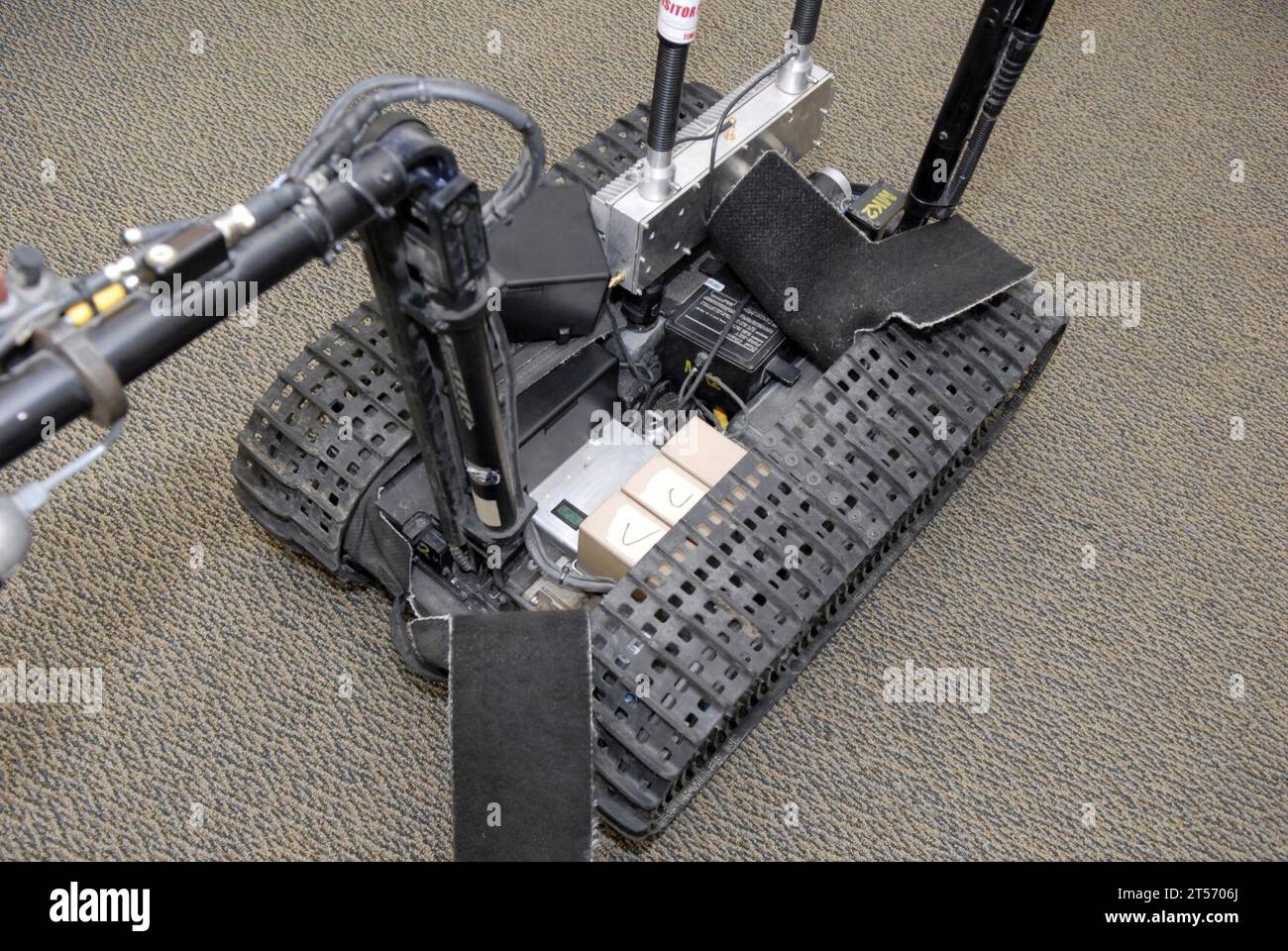 US Navy A Talon EOD robot with new batteries is displayed at the Office ...