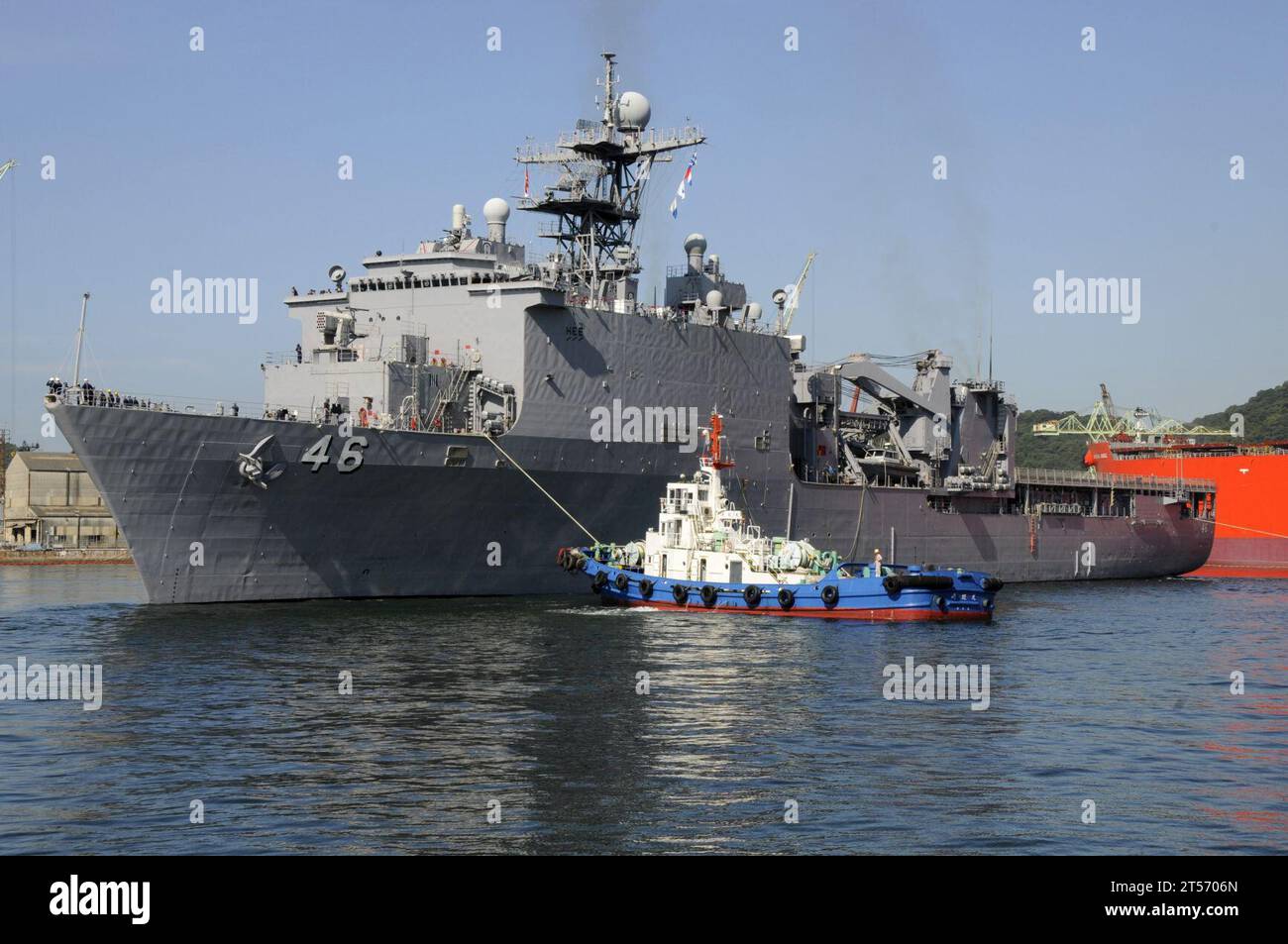 US Navy A tug pulls the dock landing ship USS Tortuga (LSD 46) as she ...