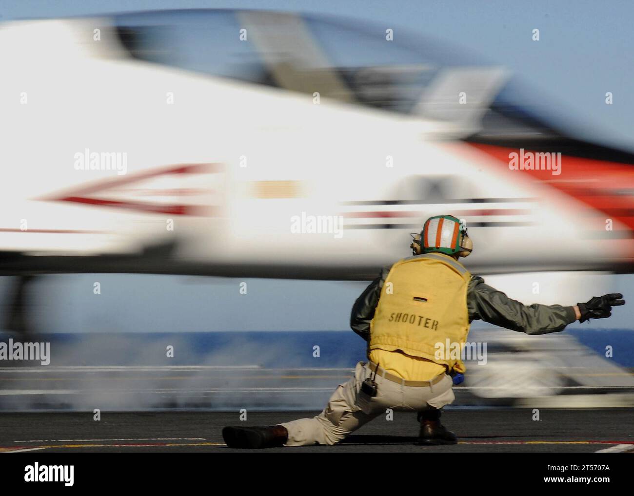 US Navy A shooter launches a T-45 Goshawk training aircraft assigned to ...