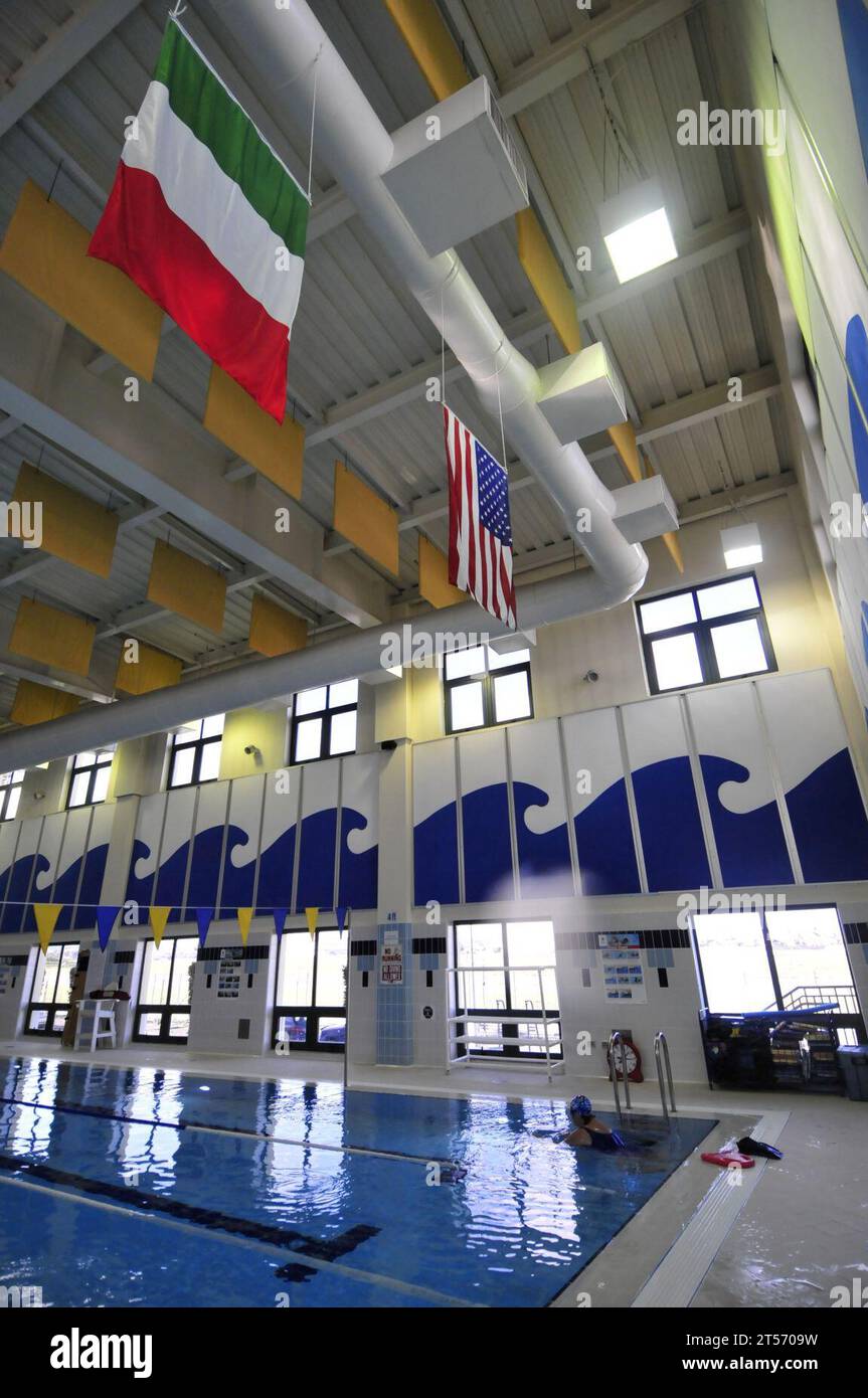 US Navy A woman swims laps at the Capodichino Fit Zone indoor pool ...