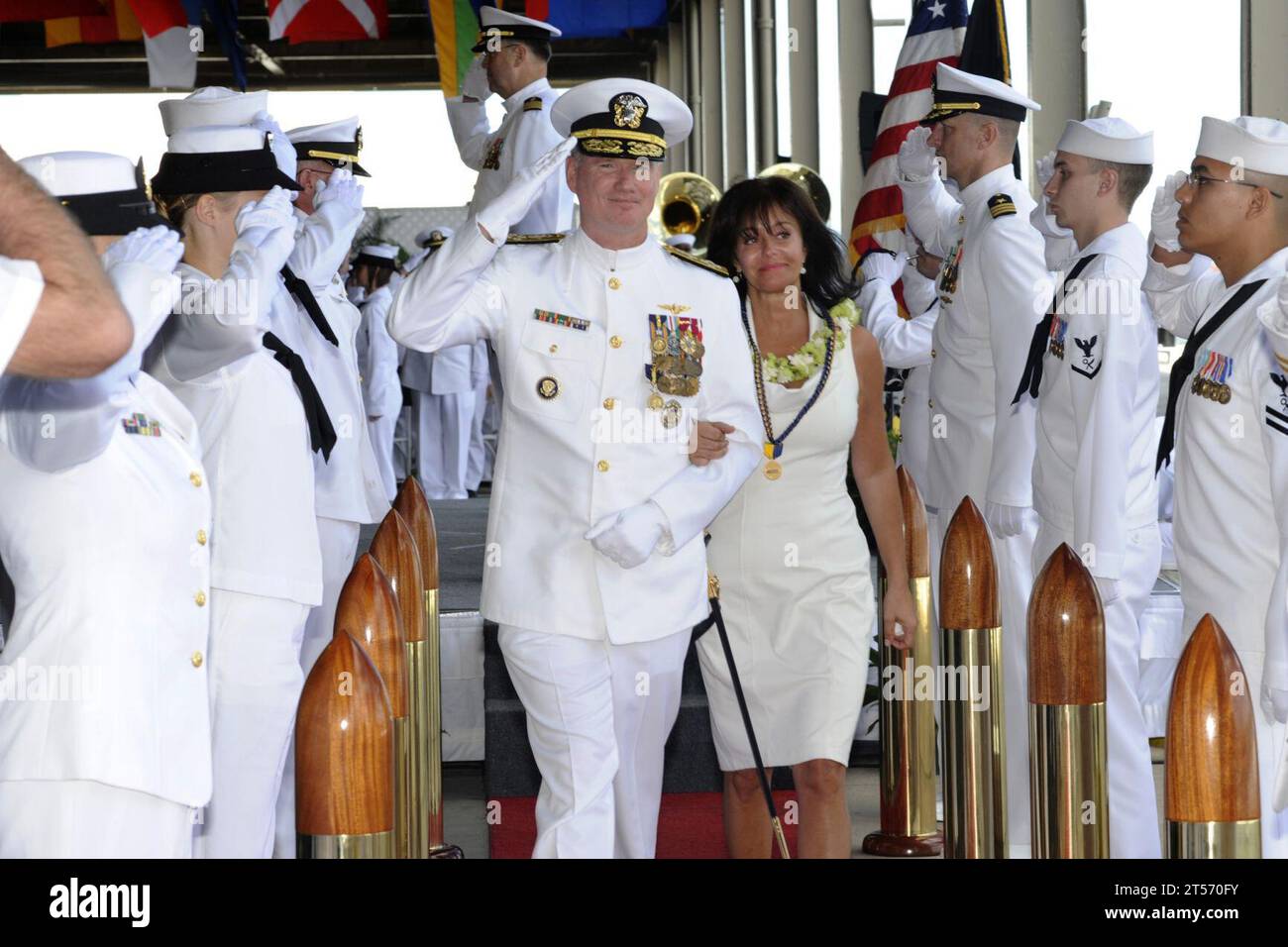 US Navy Adm. Patrick M. Walsh and his wife pass through ceremonial ...