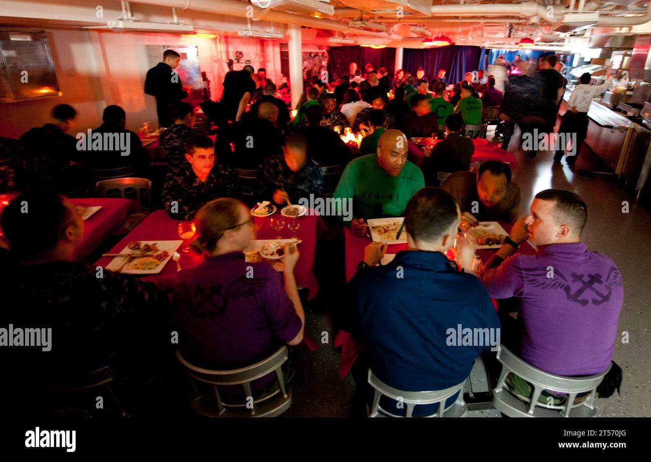 US Navy ailors take part in a December birthday meal celebration on the ...