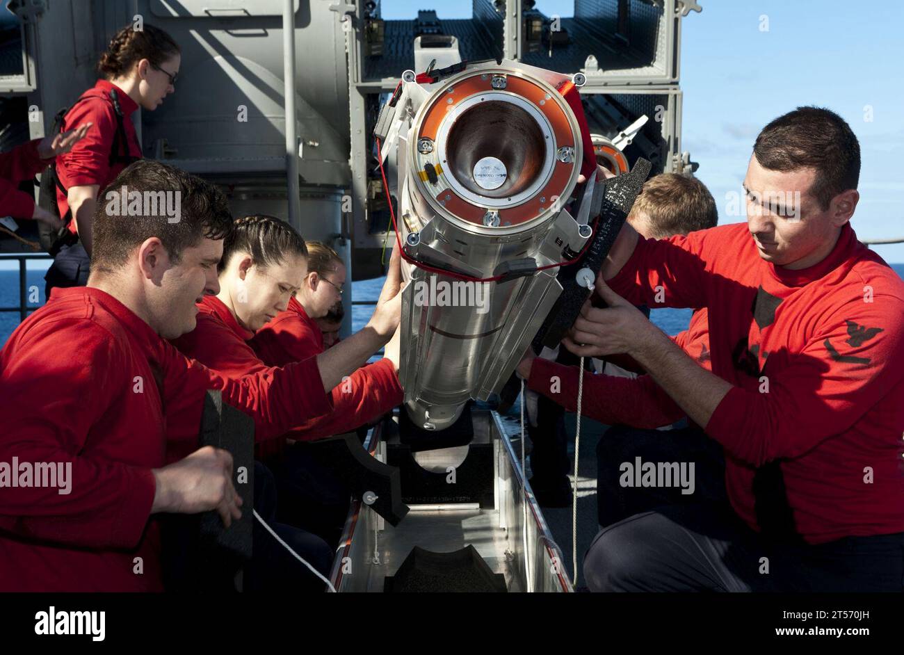 US Navy ailors aboard the Nimitz-class aircraft carrier USS John C ...