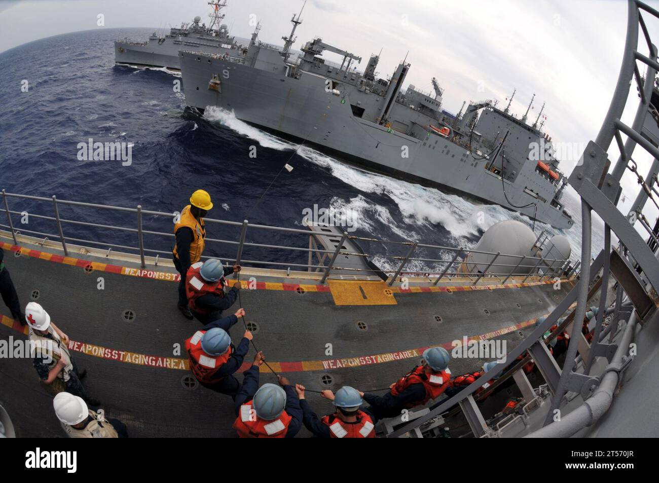 US Navy ailors aboard the forward-deployed amphibious assault ship USS ...