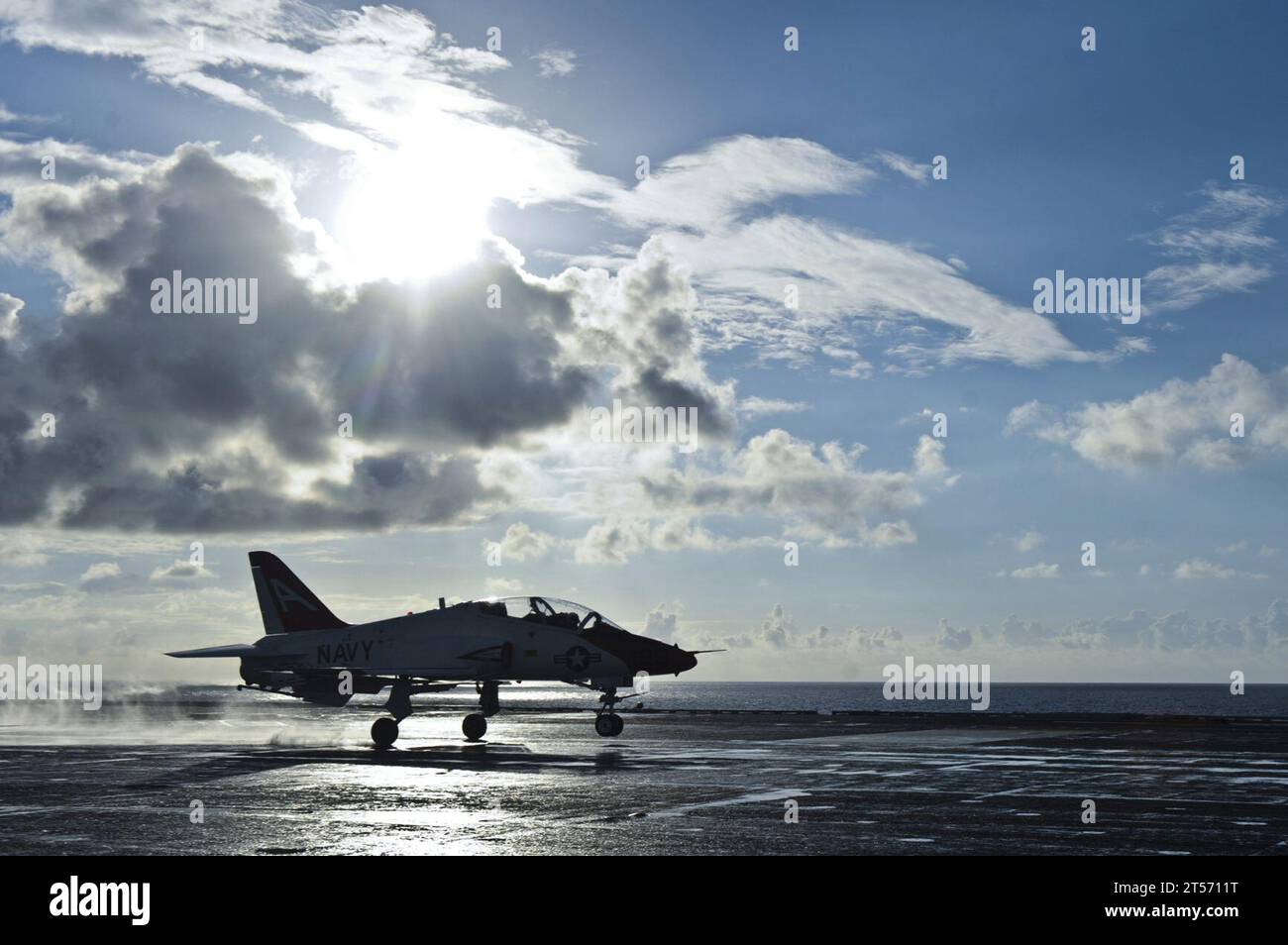US Navy An aircraft performs a touch-and-go on the flight deck.jpg ...
