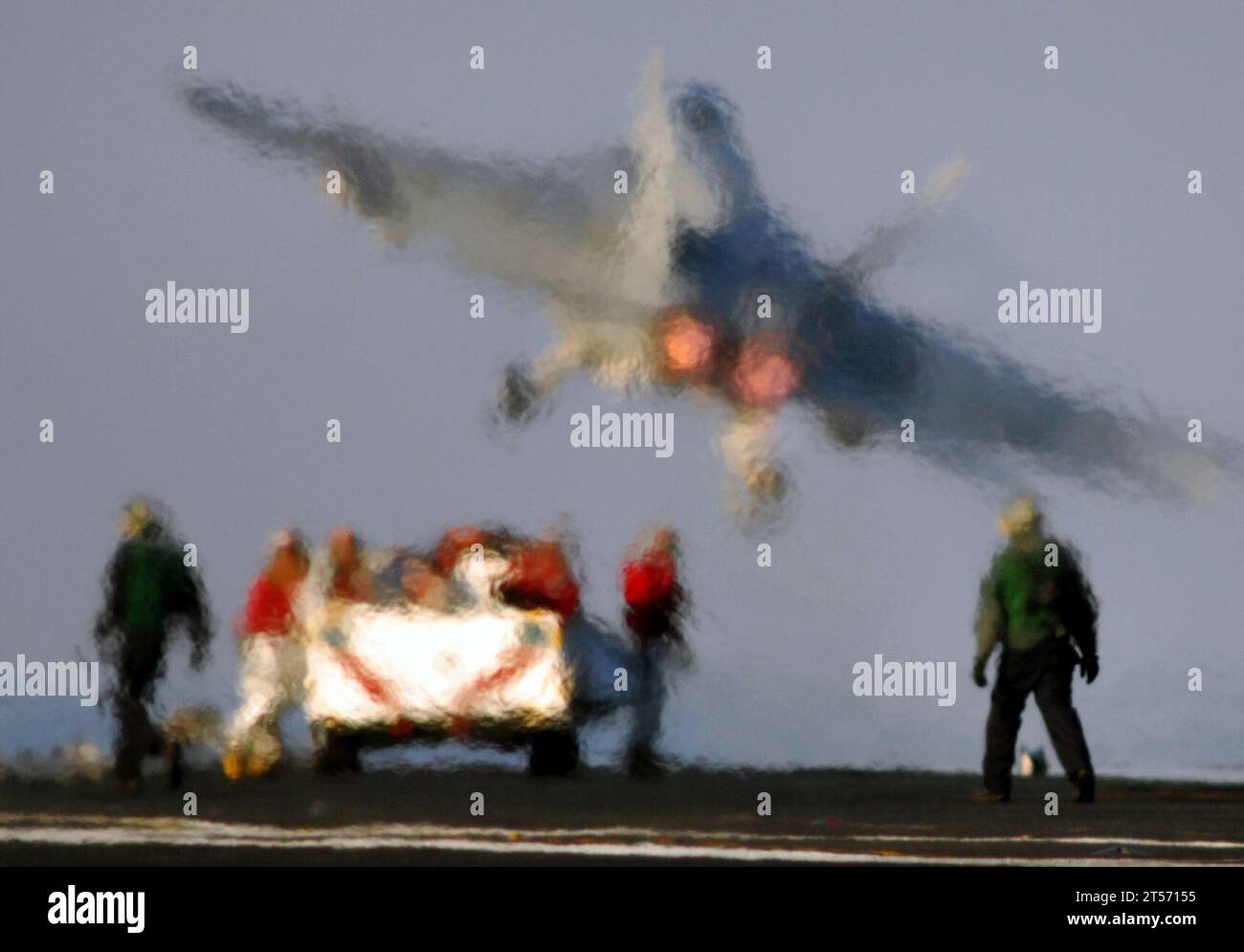US Navy An F18 Hornet launches off the flight deck during flight ...