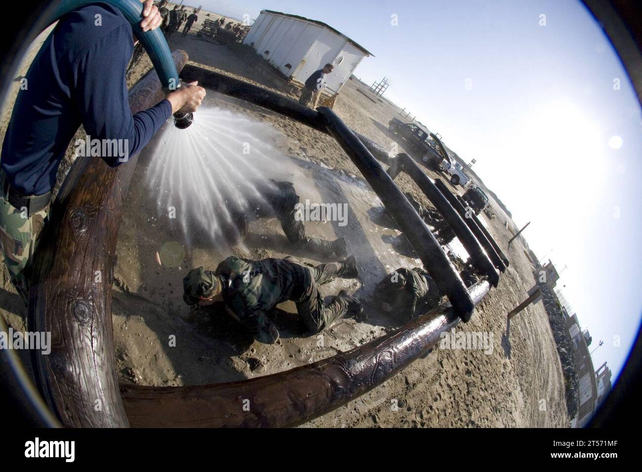 US Navy An instructor at the Navy Basic Underwater Demolition-SEAL ...