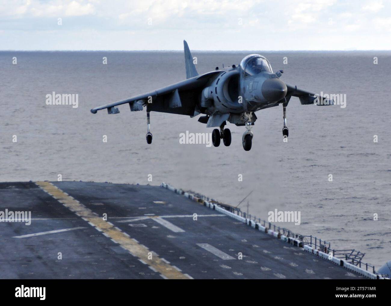 US Navy An Italian AV-8B Harrier lands on the flight deck aboard the ...