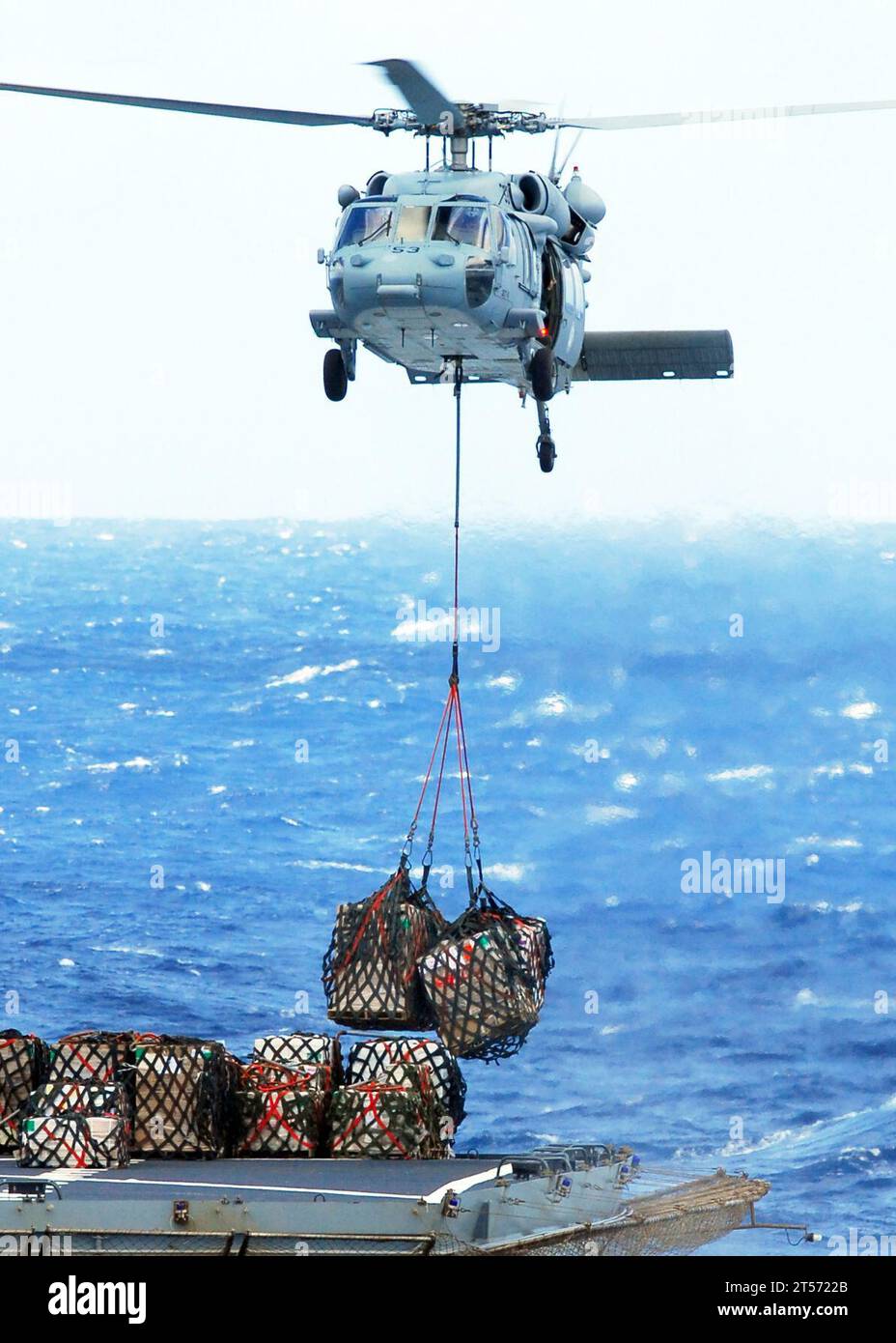 US Navy An MH-60S Sea Hawk lifts cargo off the flight deck of the ...