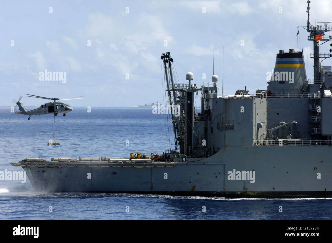 US Navy An MH-60S Seahawk transfers ammunition from the aircraft ...