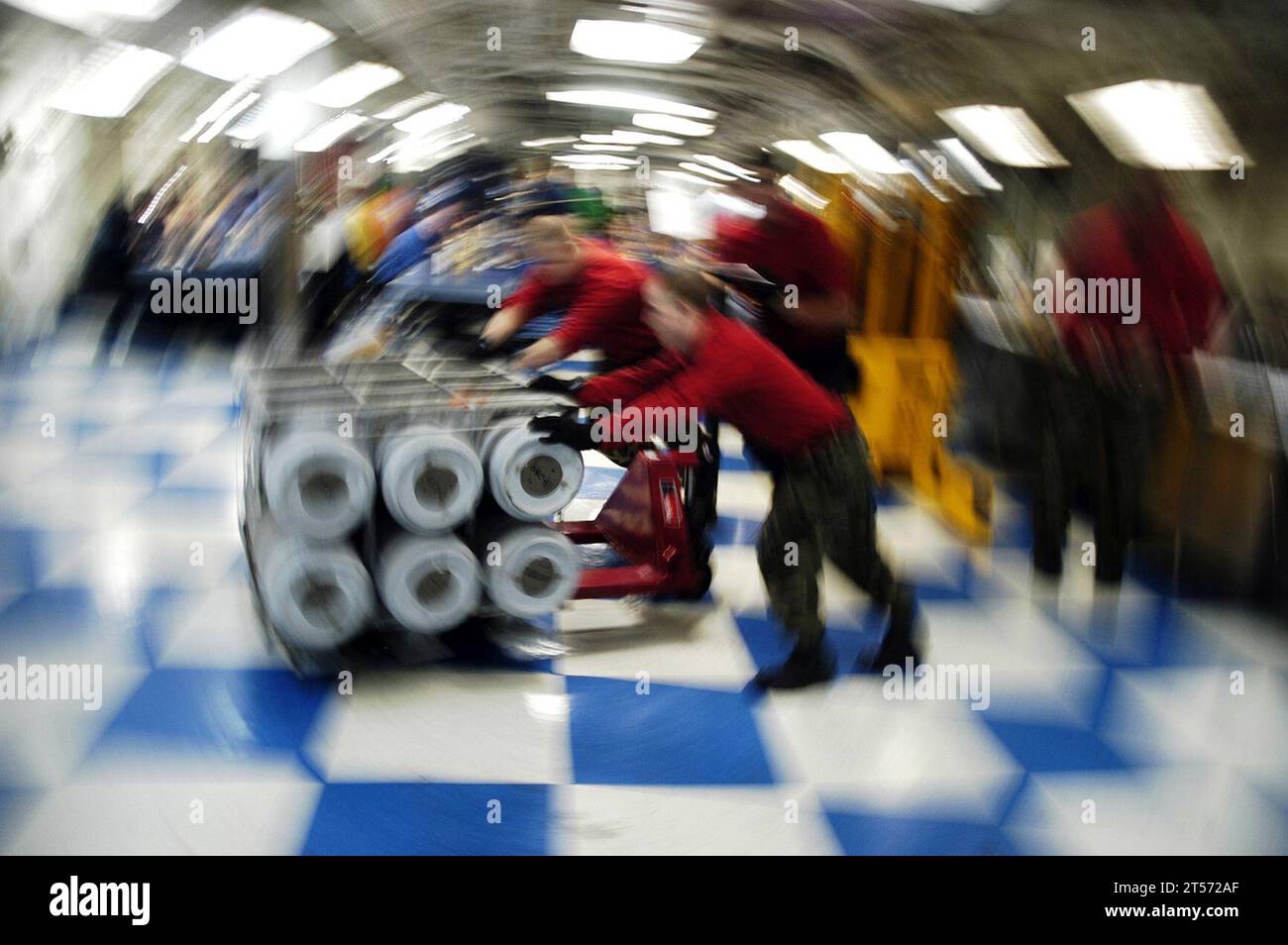 US Navy Aviation Ordnancemen from the weapons department aboard the ...