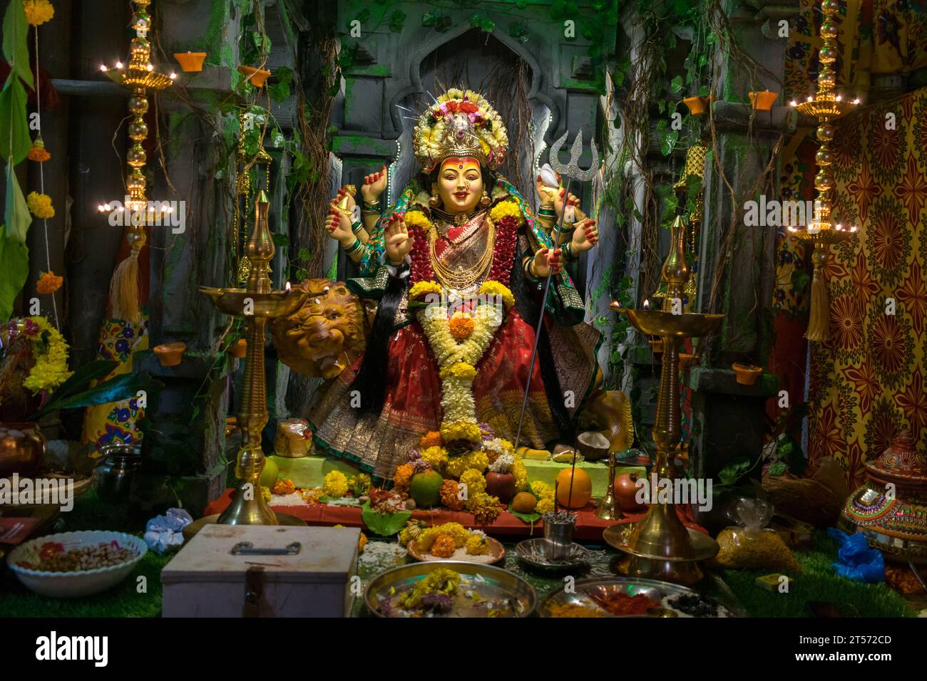 A beautiful idol of Maa Durga being worshipped at a pandal during ...