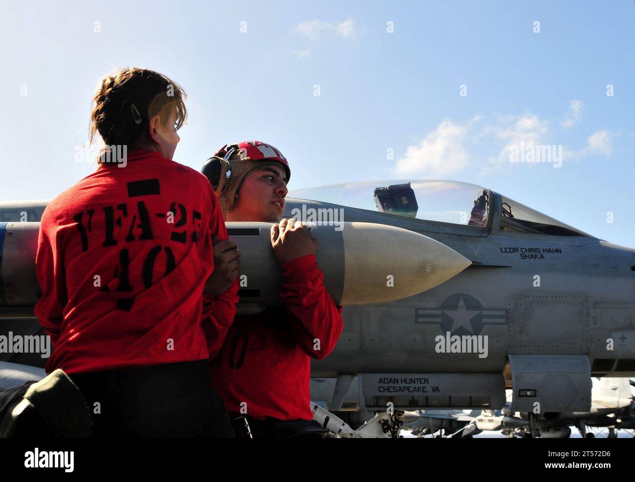 US Navy Aviation ordnancemen, assigned to Strike Fighter Squadron (VFA ...