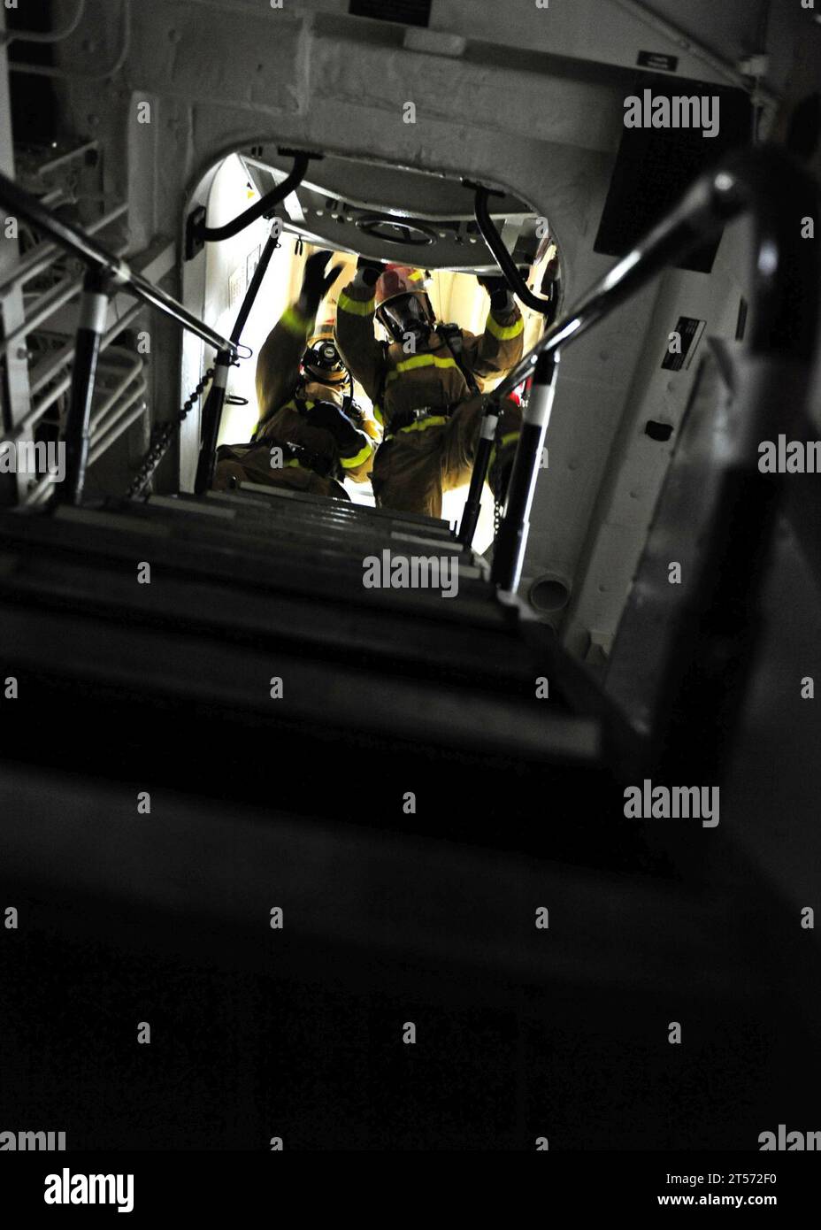 US Navy Boundary men raise a hatch to set a smoke boundary during a ...