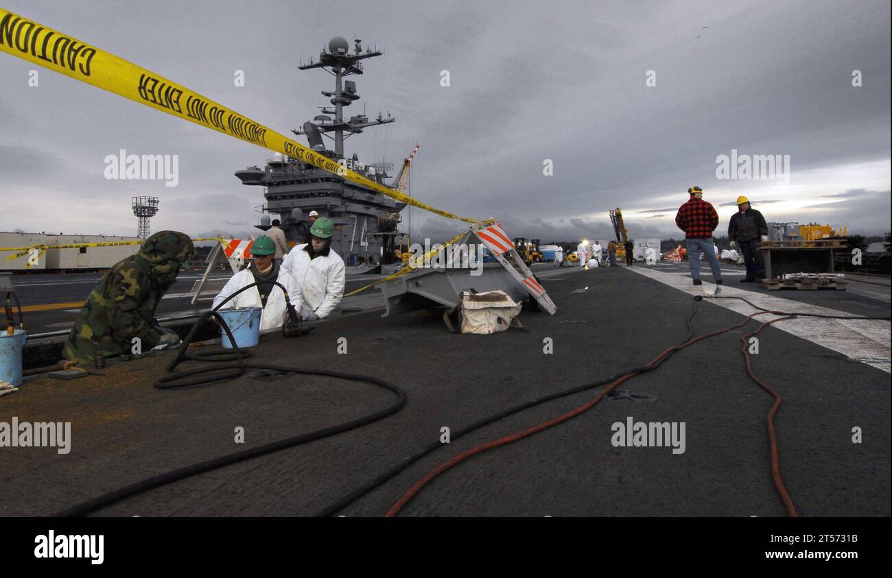 US Navy Civilian yard workers from Puget Sound Naval Shipyard perform ...