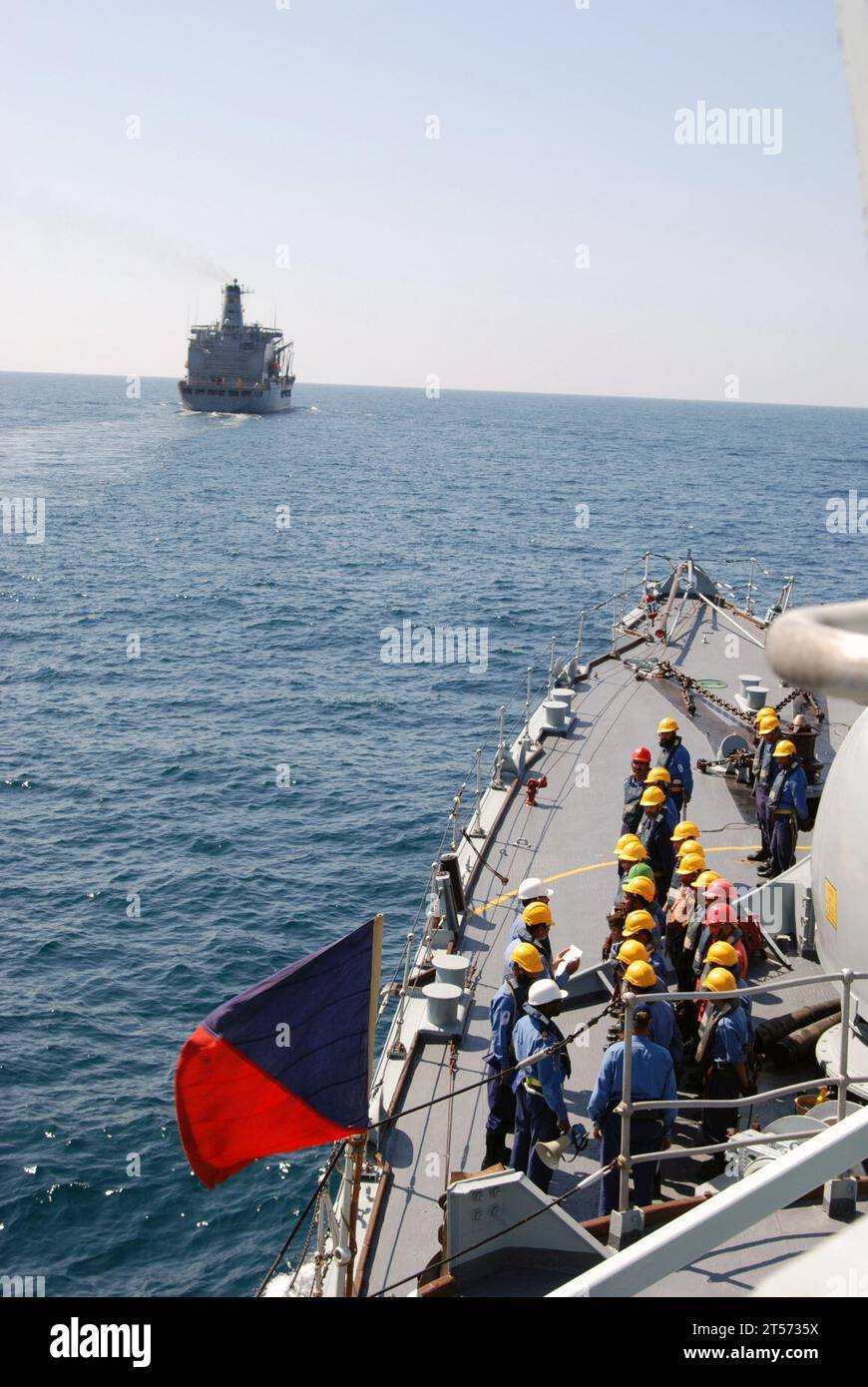 US Navy Crew members aboard Pakistan Navy Ship (PNS) Babur prepare for ...