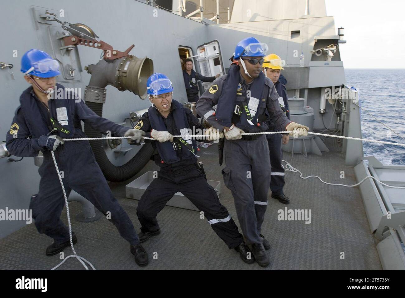 US Navy Crew members from the Republic of Singapore ship RSS Steadfast ...