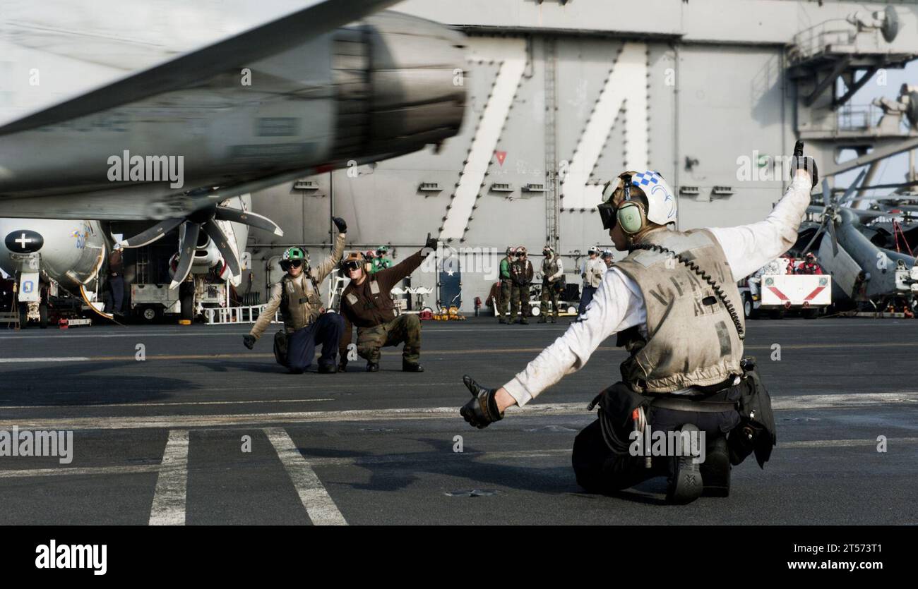 US Navy Final checkers signal for the launching of an F18C Hornet.jpg ...