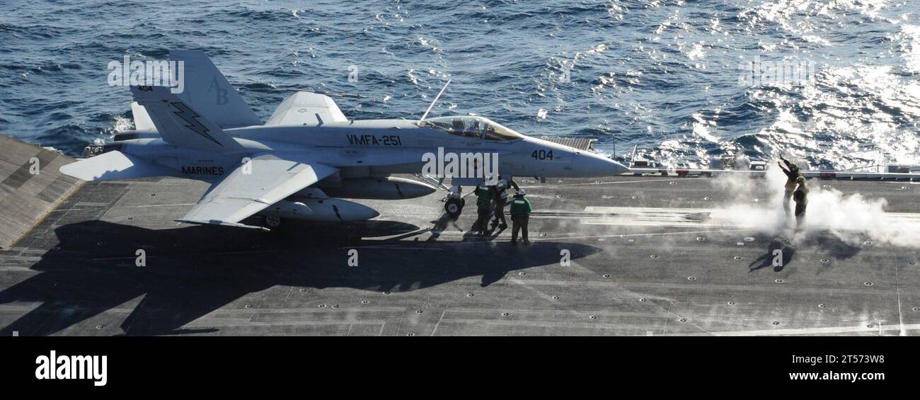 US Navy Flight deck crew make a ready deck for a jet landing.jpg Stock ...