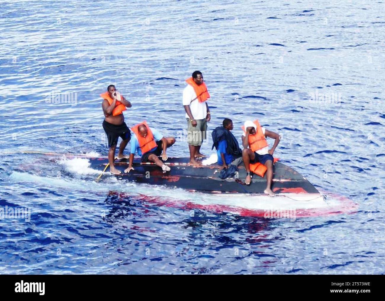 US Navy Five stranded Bahamian nationals were spotted and rescued by ...