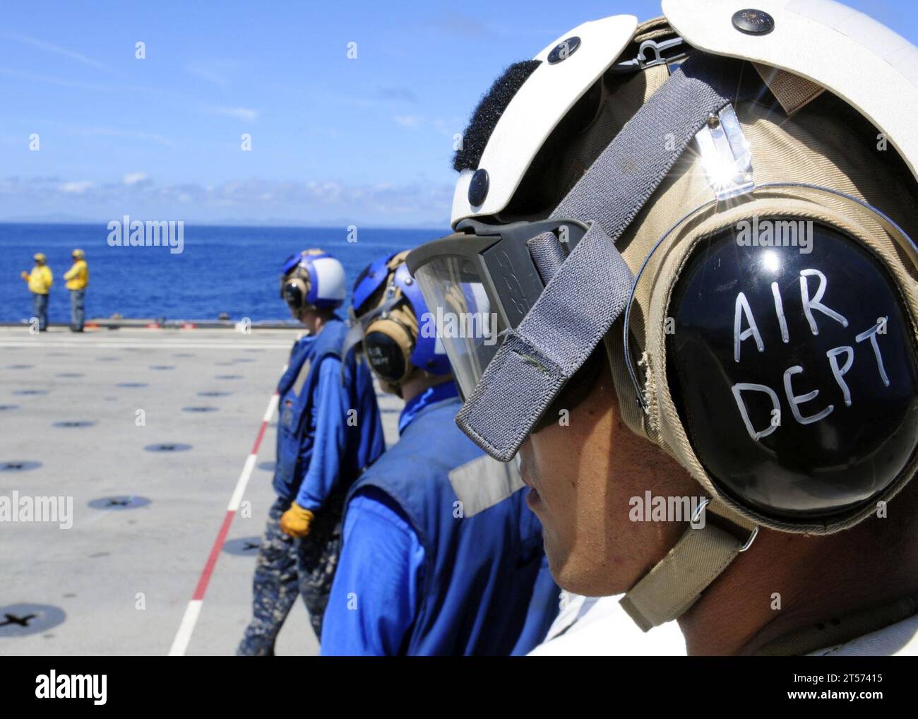 US Navy Flight deck personnel assigned to the forward-deployed ...