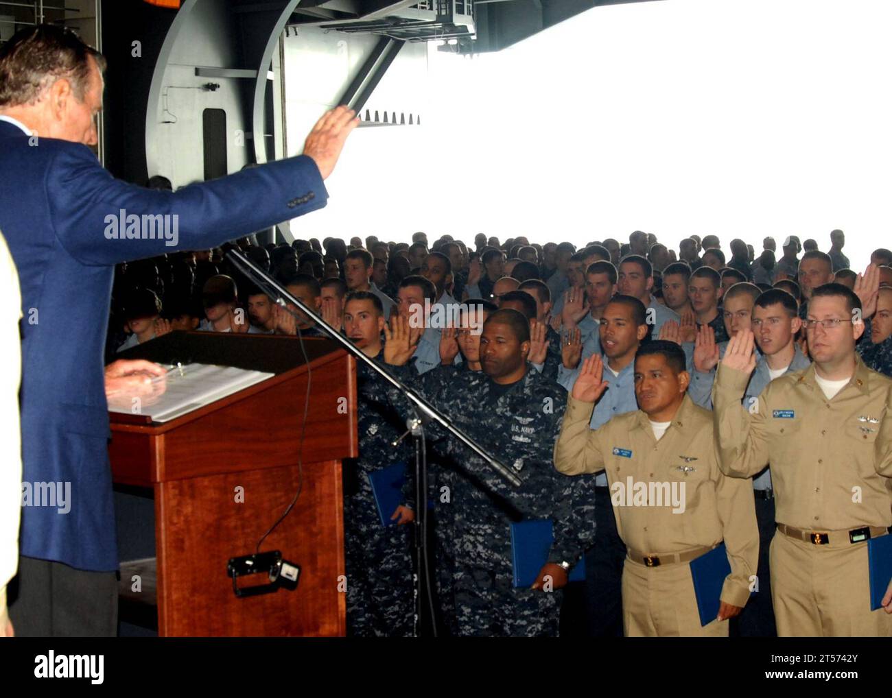 US Navy Former U.S. President George H.W. Bush reads the Oath of Enlistment during a mass re ...