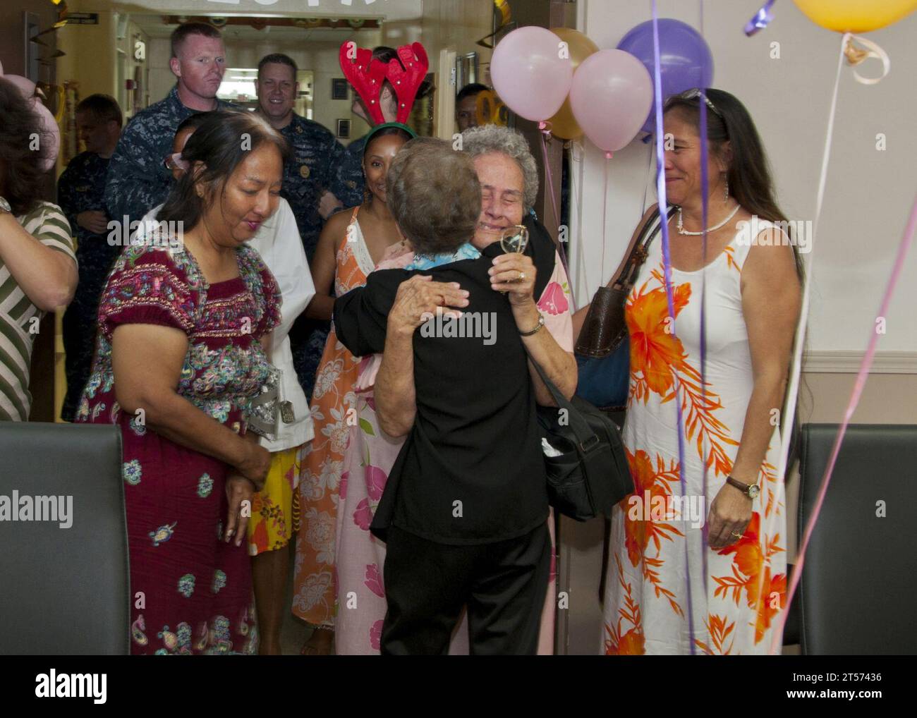 US Navy Guadalupe Mafnas is embraced during a celebration of her 50 ...
