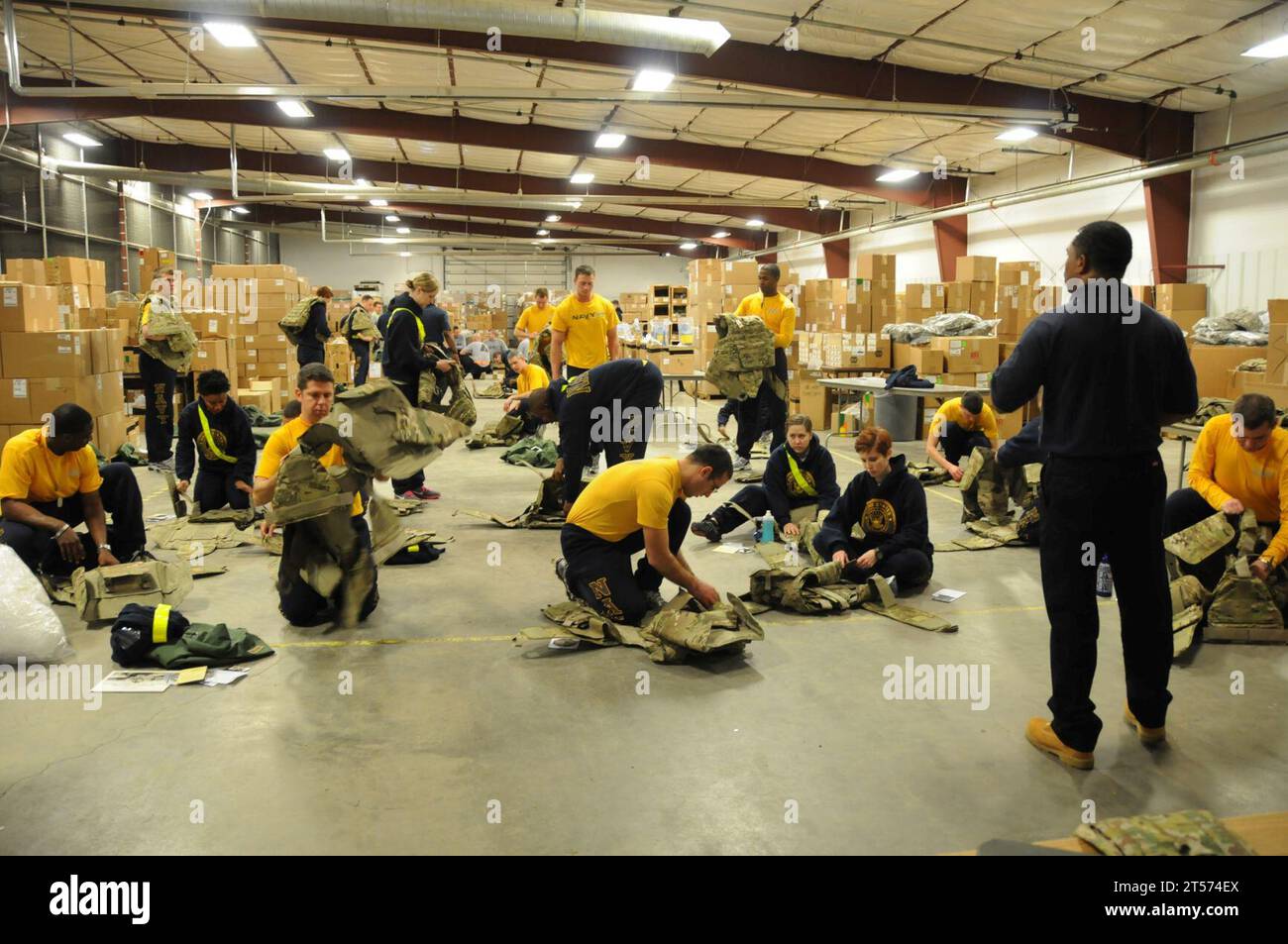 US Navy Individual augmentee Sailors are instructed by civilian ...