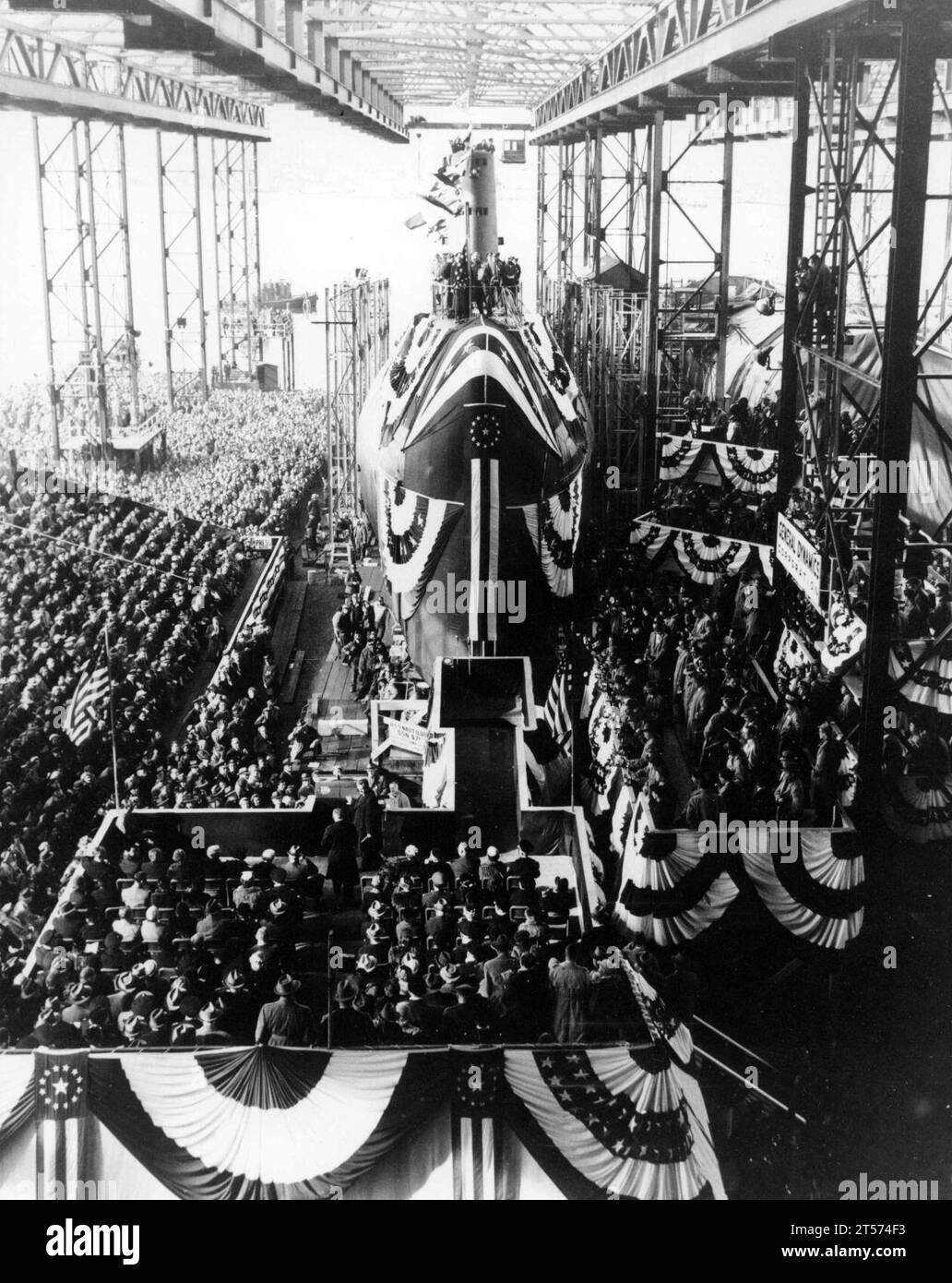 US Navy In this file taken Jan. 21, 1954, spectators gather around the ...