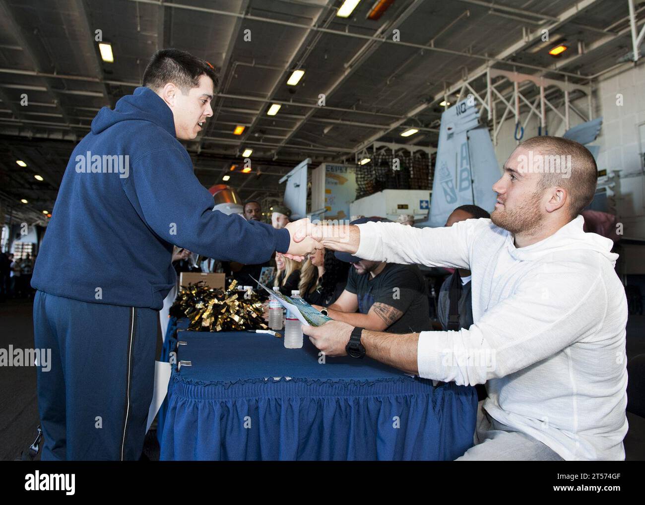 US Navy Jacksonville Jaguars players and cheerleaders sign autographs ...