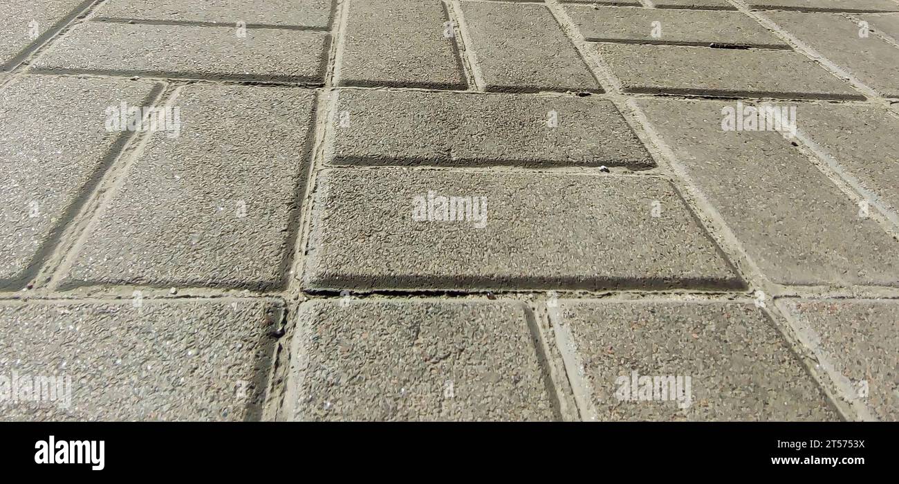 Pavement with bricks, road background, road surface close view Stock ...