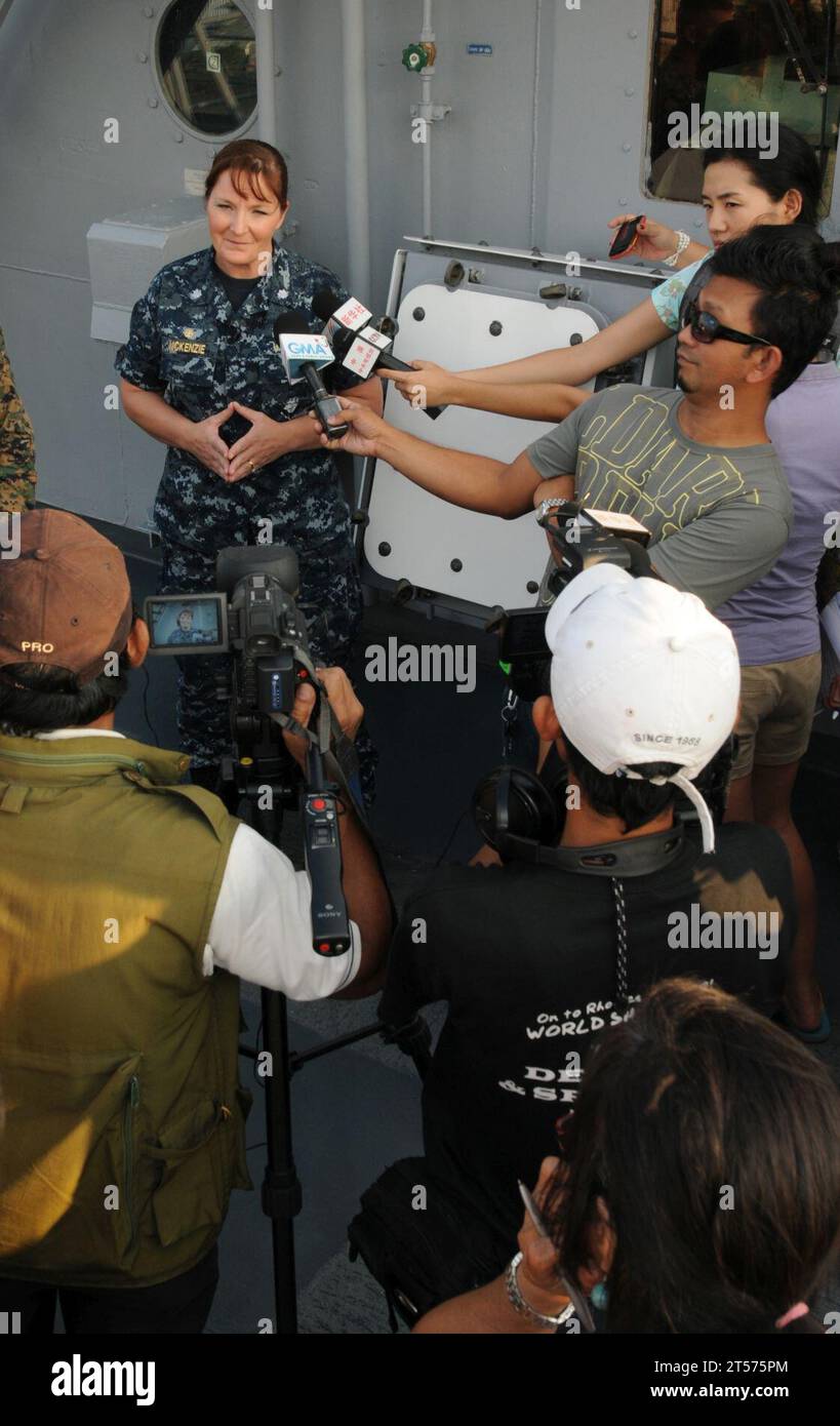 US Navy mdr. Carol McKenzie, commanding officer of the amphibious dock ...