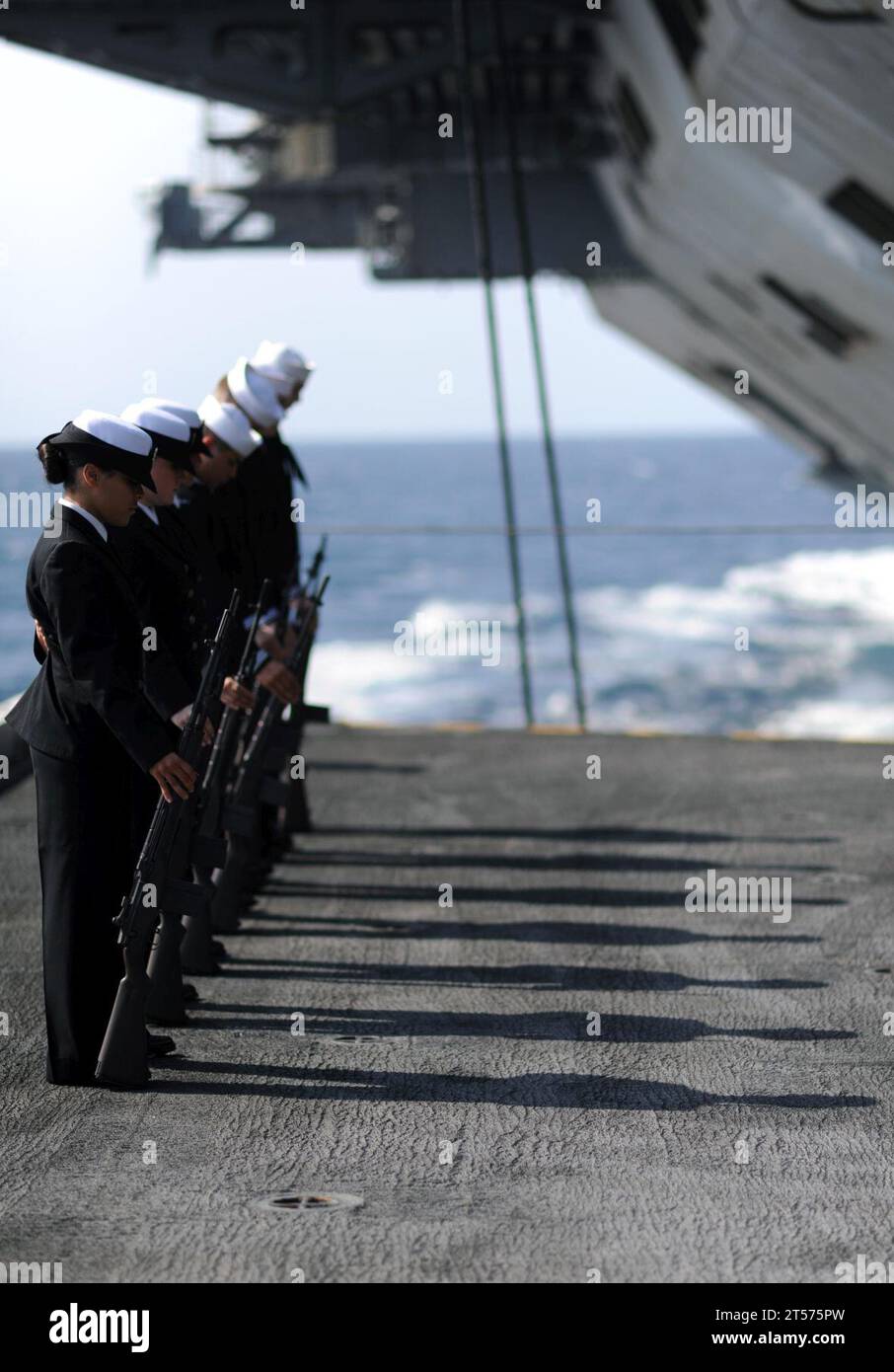 US Navy Members of the honor guard aboard the aircraft carrier USS ...