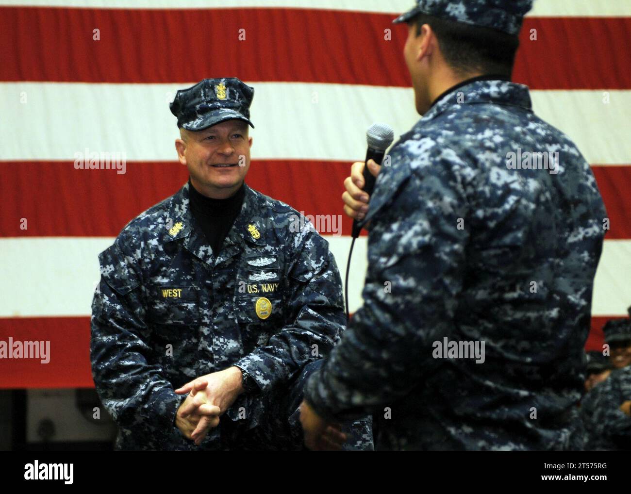 US Navy MCPON Rick D. West speaks during an all-hands call aboard the ...