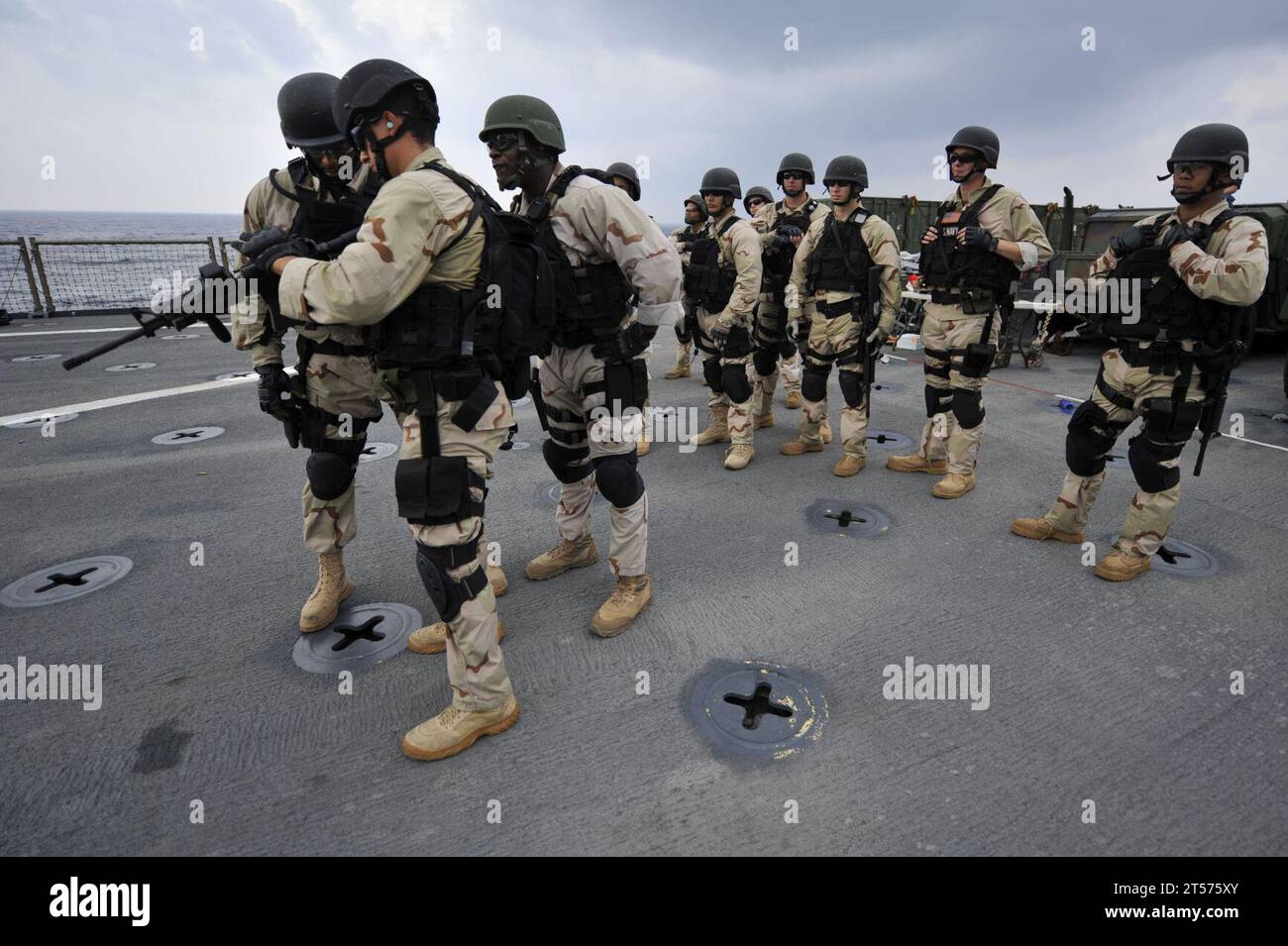 US Navy Members of the visit, board, search and seizure team aboard the ...