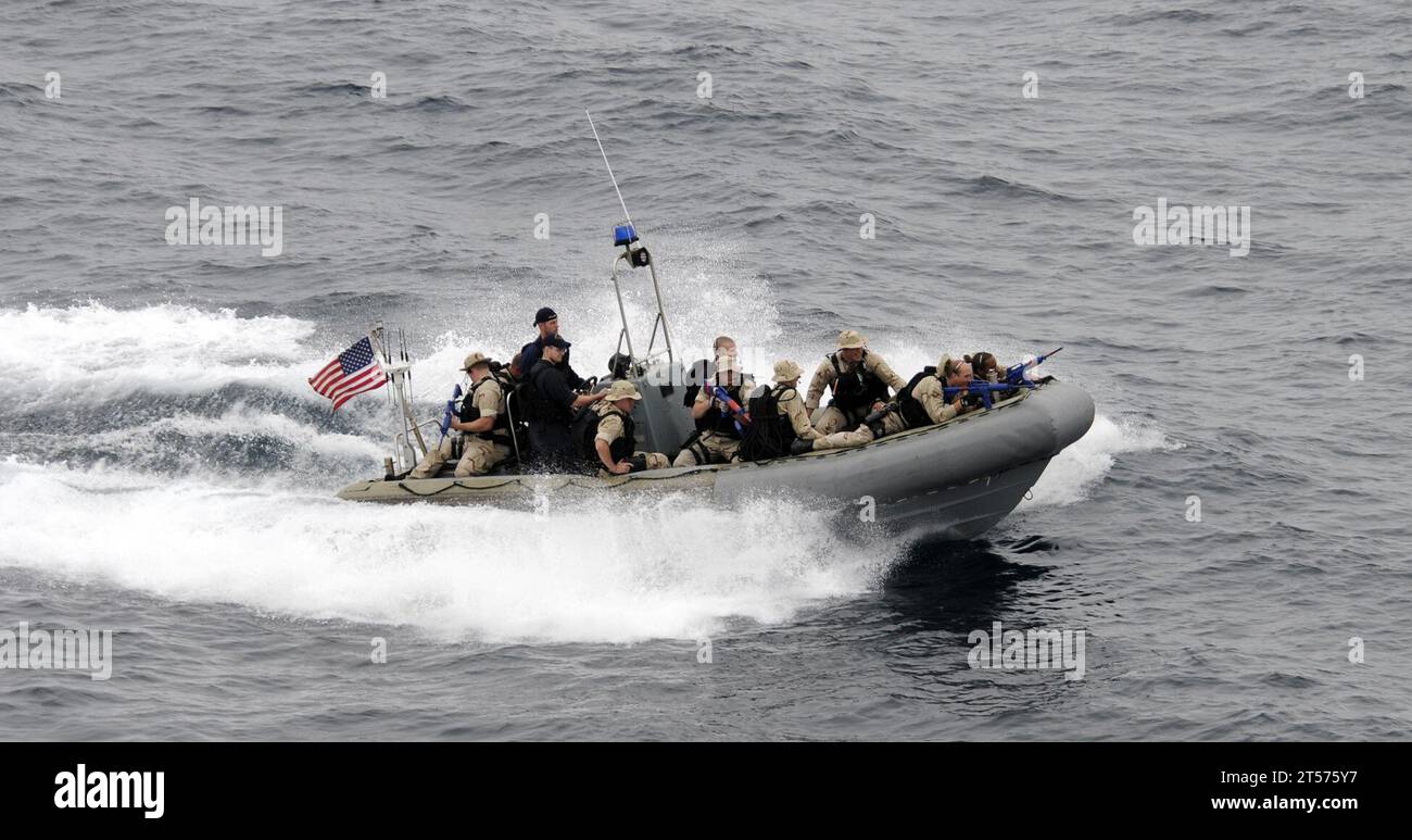 US Navy Members of the visit, board, search and seizure team assigned ...