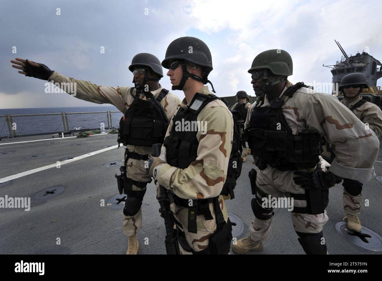 US Navy Members of the visit, board, search and seizure team aboard the ...