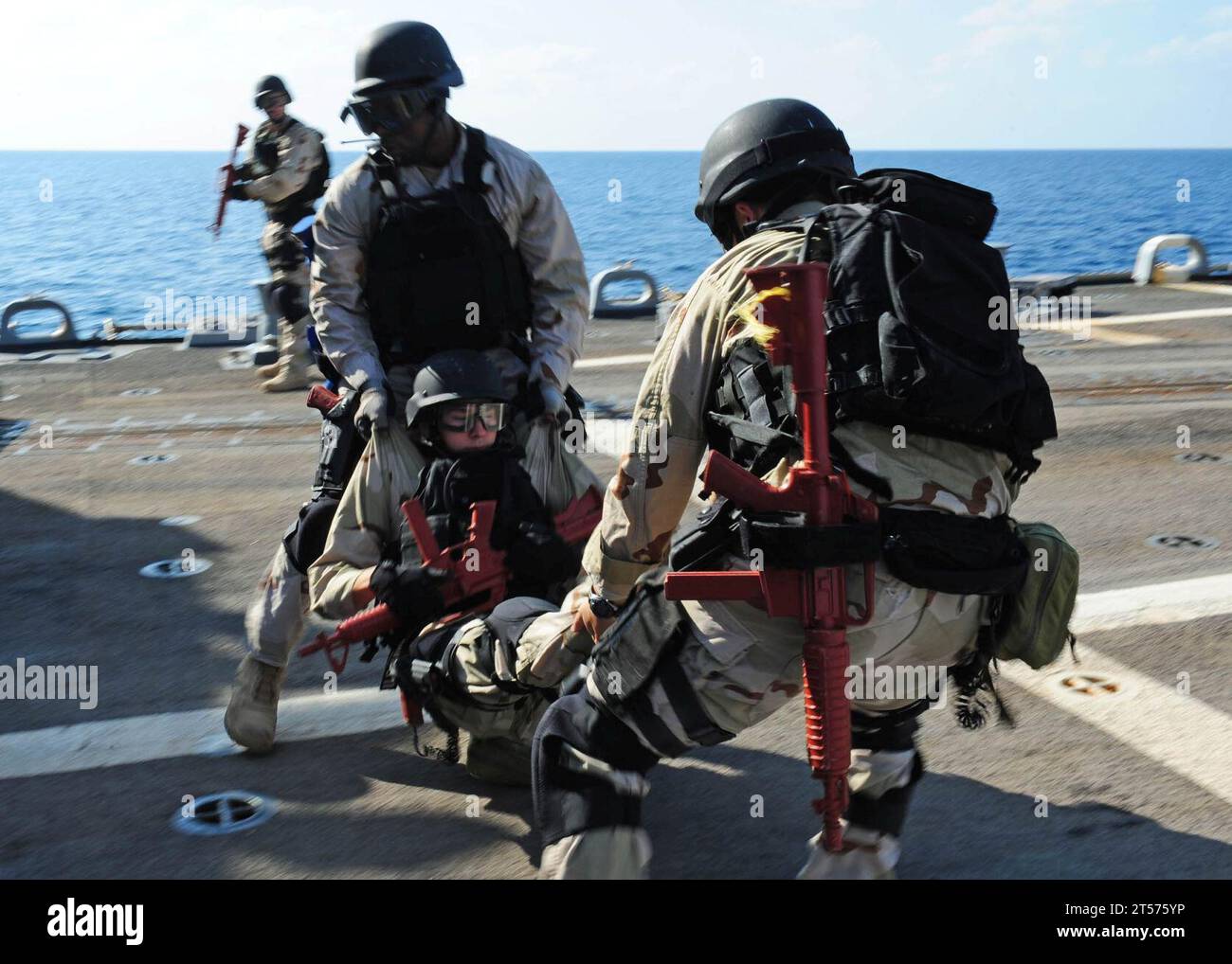 US Navy Members of the visit, board, search and seizure team aboard the ...