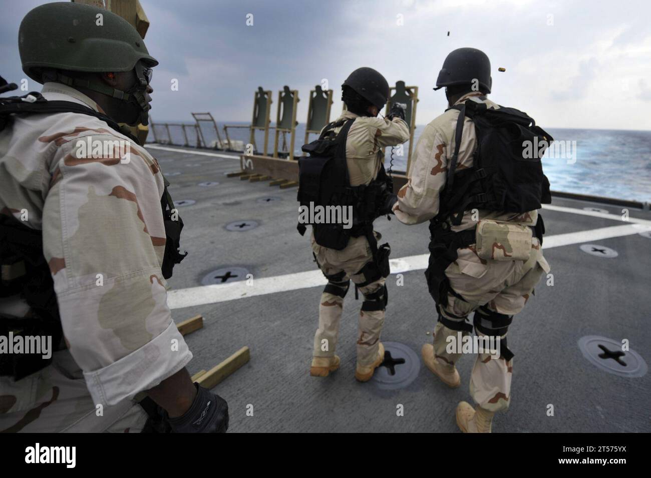 US Navy Members of the visit, board, search and seizure team aboard the ...