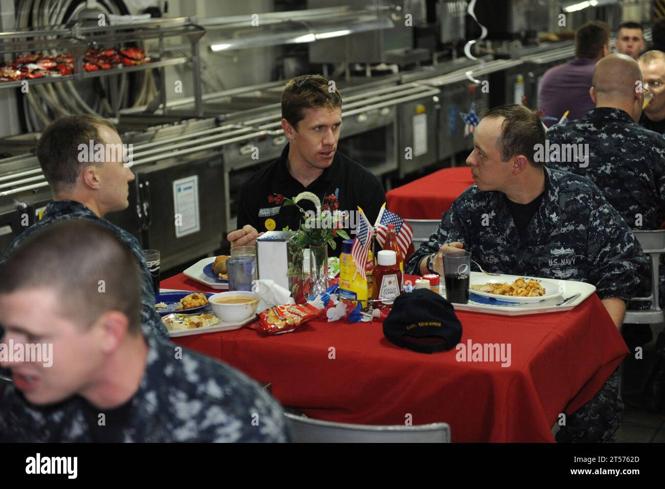 US Navy NASCAR driver Carl Edwards eats with Sailors on the mess decks ...