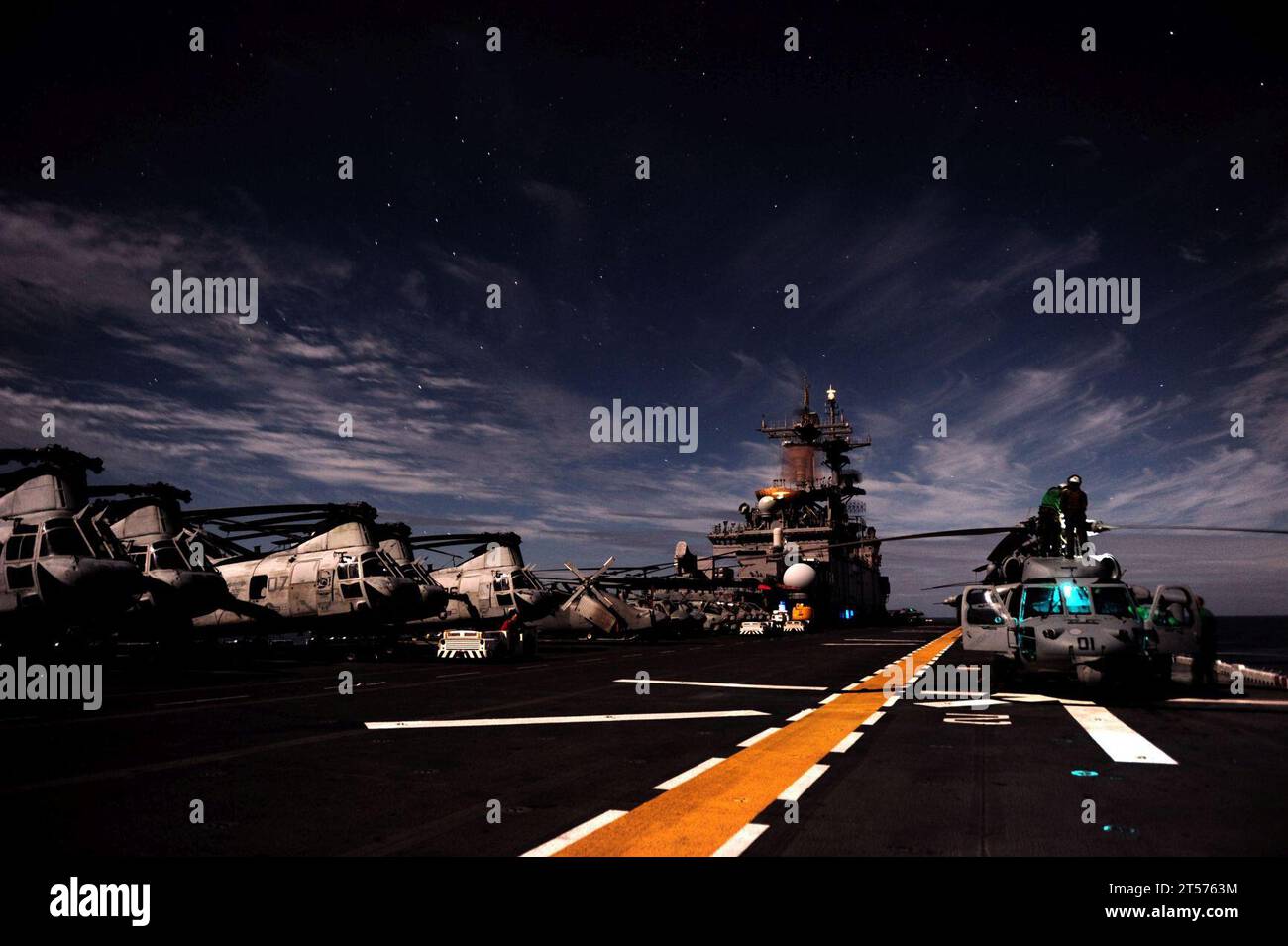 US Navy Moonlight illuminates the flight deck of the forward-deployed ...