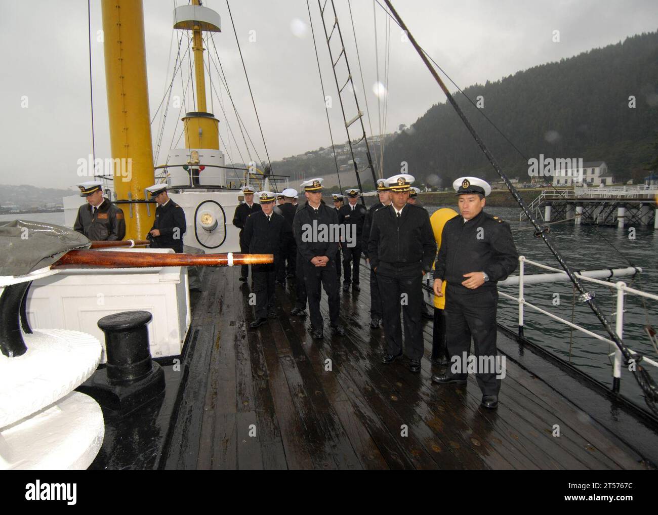 US Navy Officers assigned to the guided-missile frigate USS Boone (FFG ...