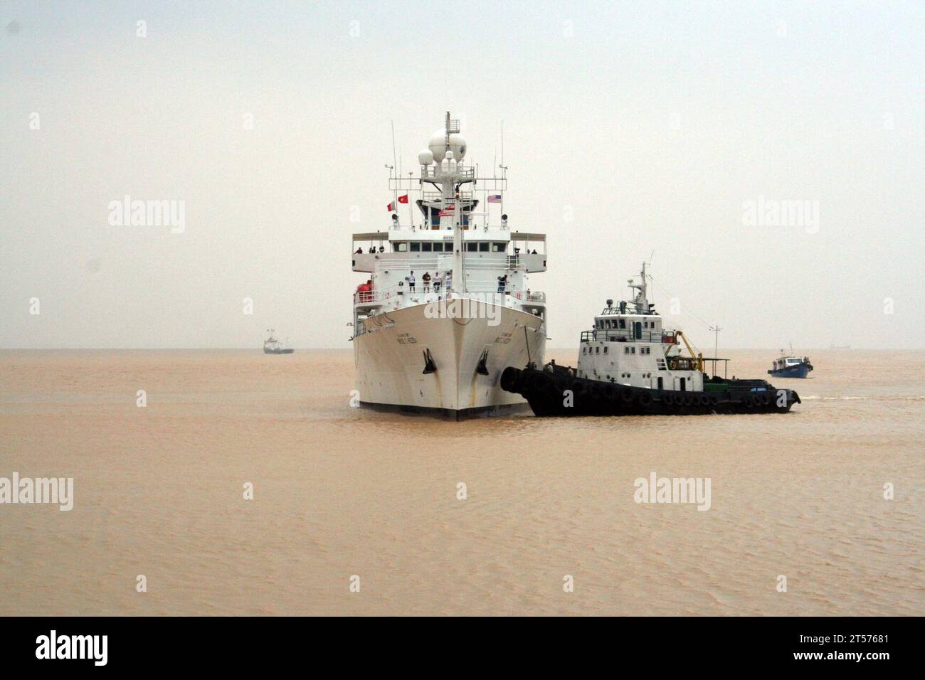 US Navy Oceanographic survey ship Bruce C. Heezen is pushed to the pier ...