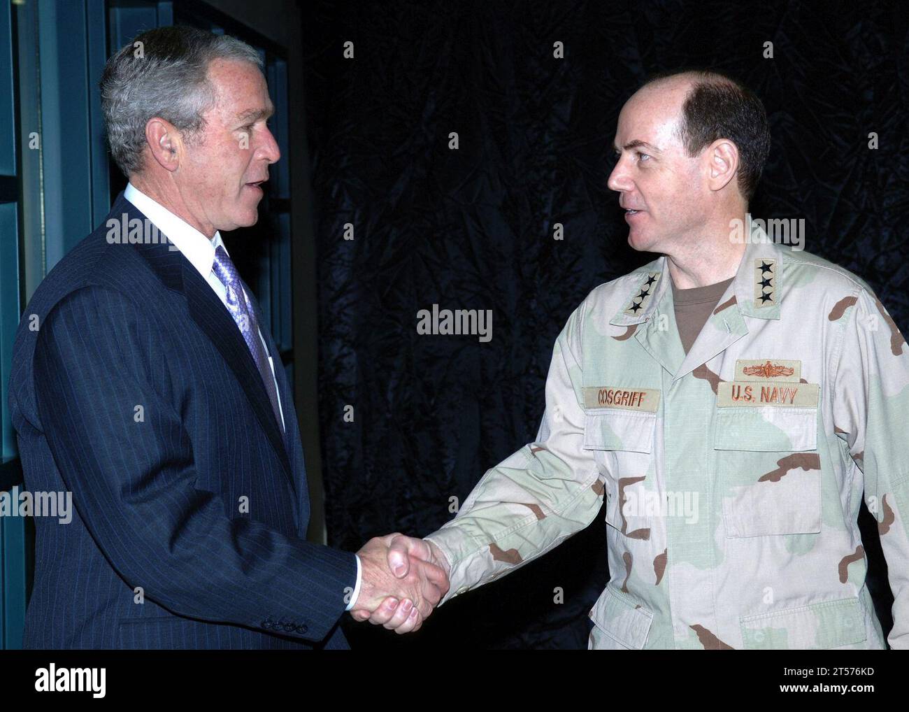 US Navy President George W. Bush greets Vice Adm. Kevin Cosgriff ...