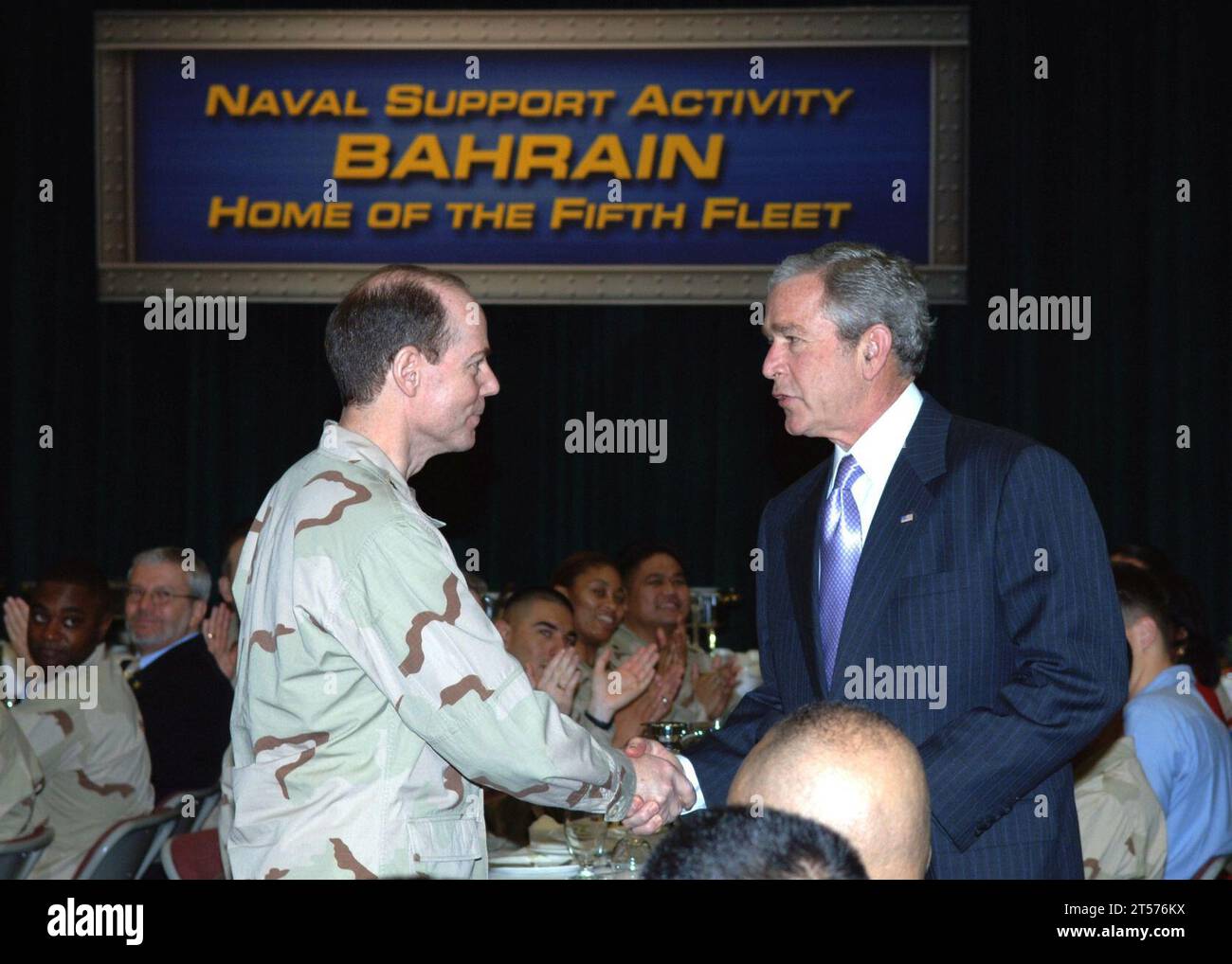 US Navy President George W. Bush greets Vice Adm. Kevin Cosgriff ...