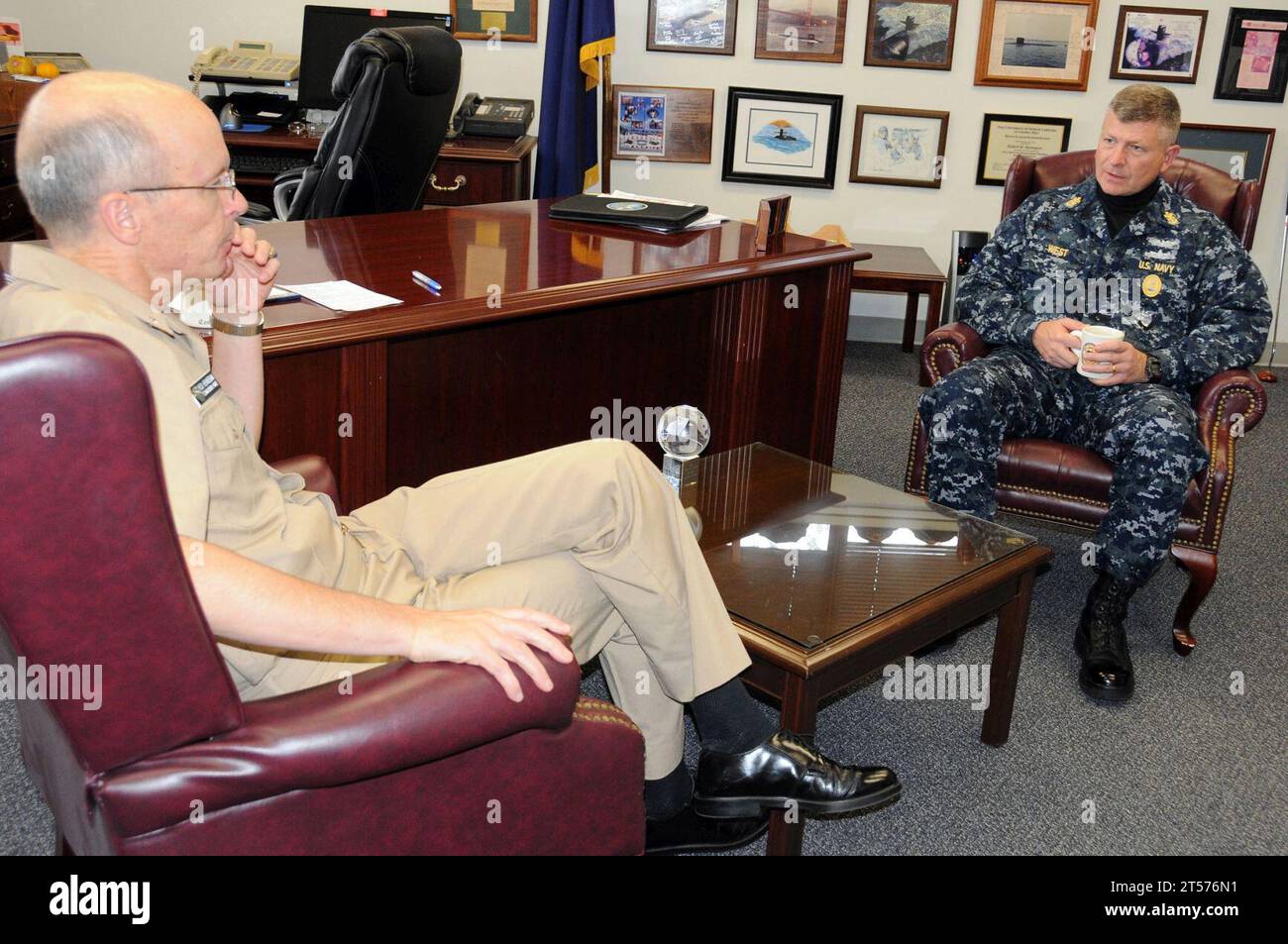 US Navy Rear Adm. Bob Hennegan, commander of Submarine Group 9, meets with Master Chief Stock ...